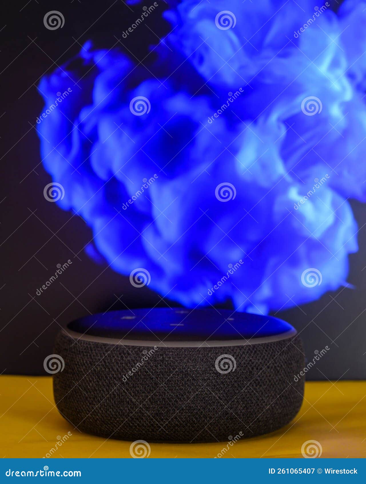 Vertical of the Black Amazon Echo Dot with Alexa Assistant with a ...