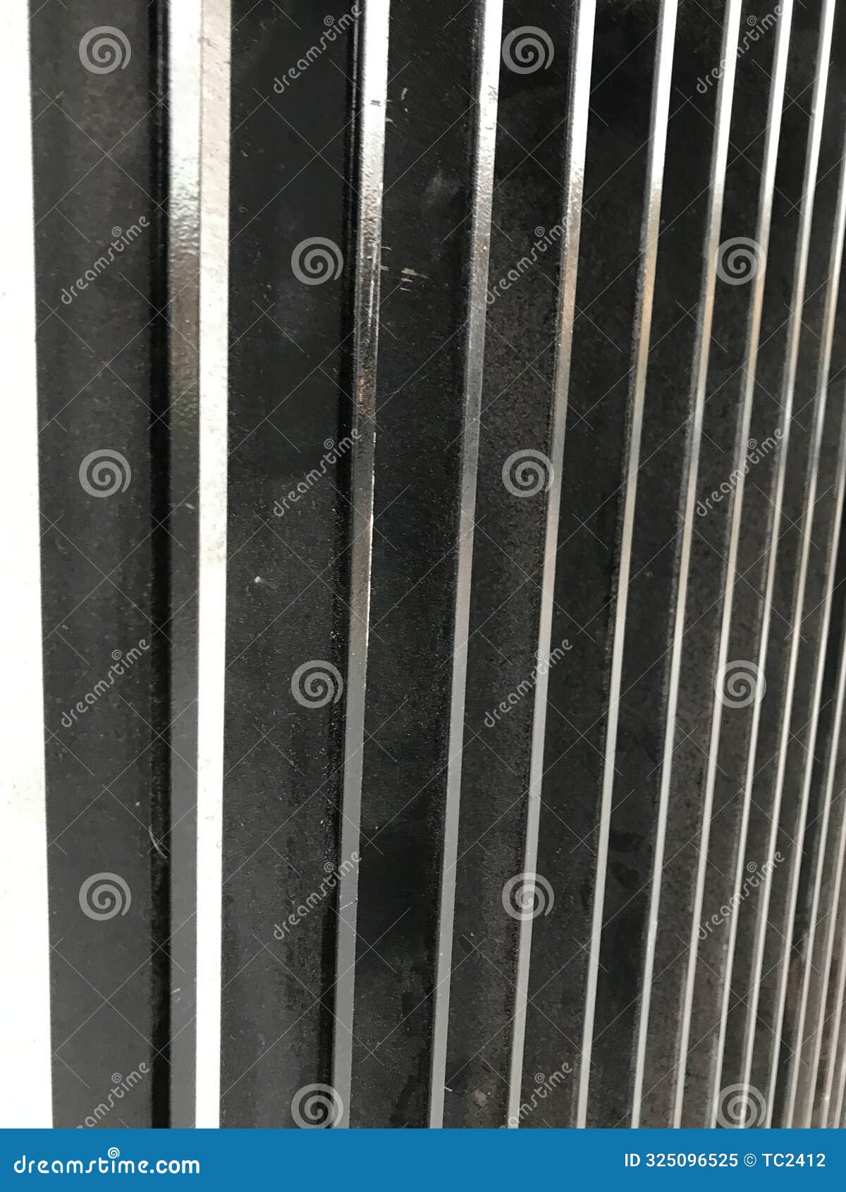Vertical Black Metal Tubes in Parallel Stock Image - Image of material ...