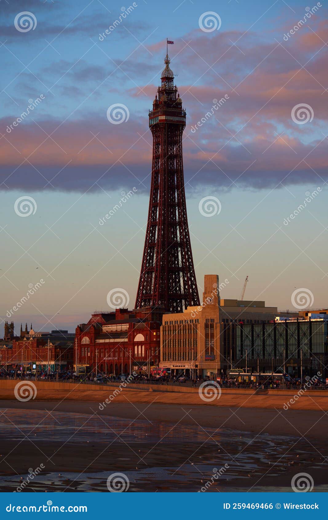 Vertical of Blackpool Tower at Sunset after a Storm, Purple Clouds and ...