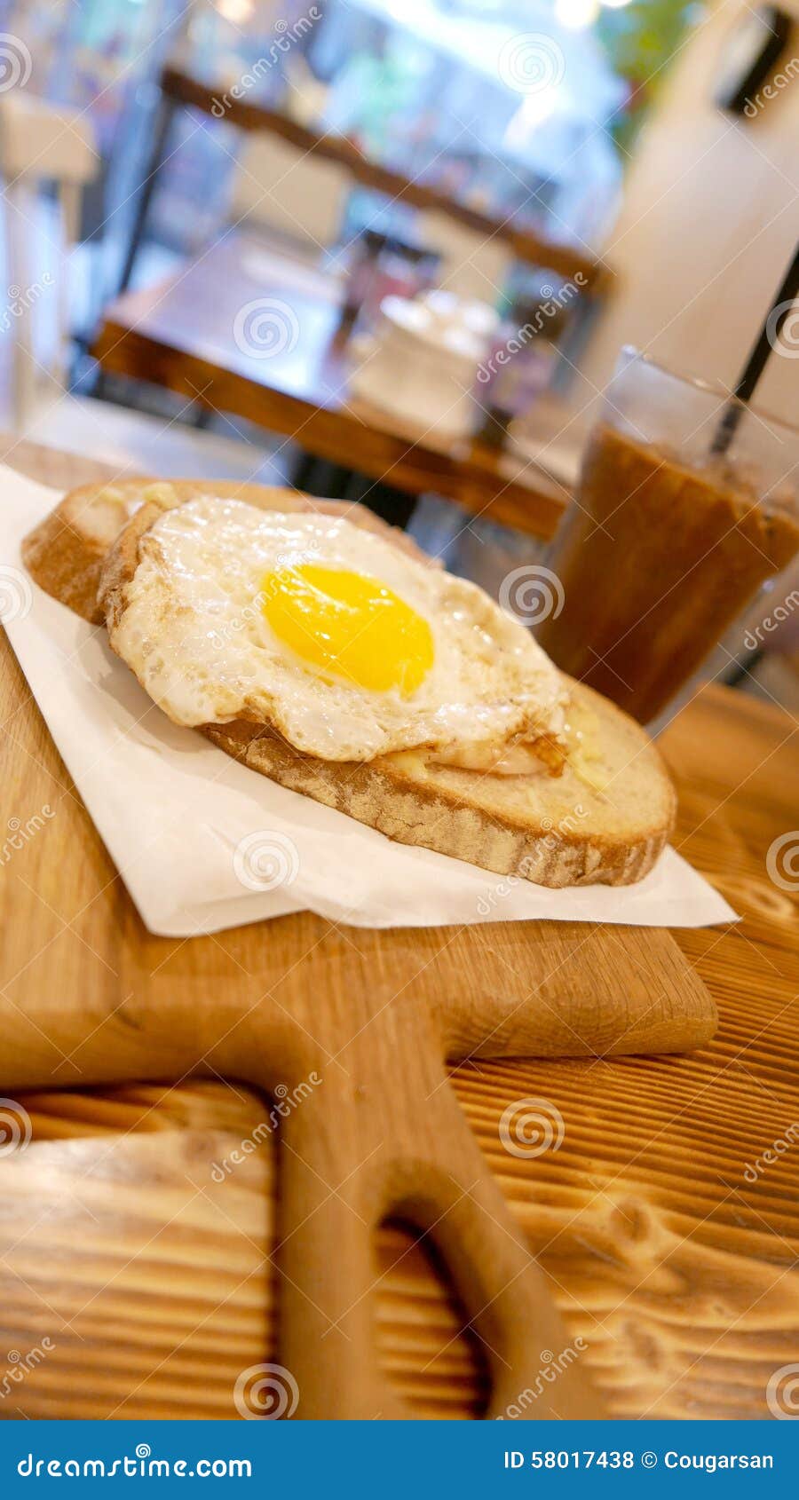 Vertical Breakfast Sun Egg Bread with Cold Drink on the Table Stock ...