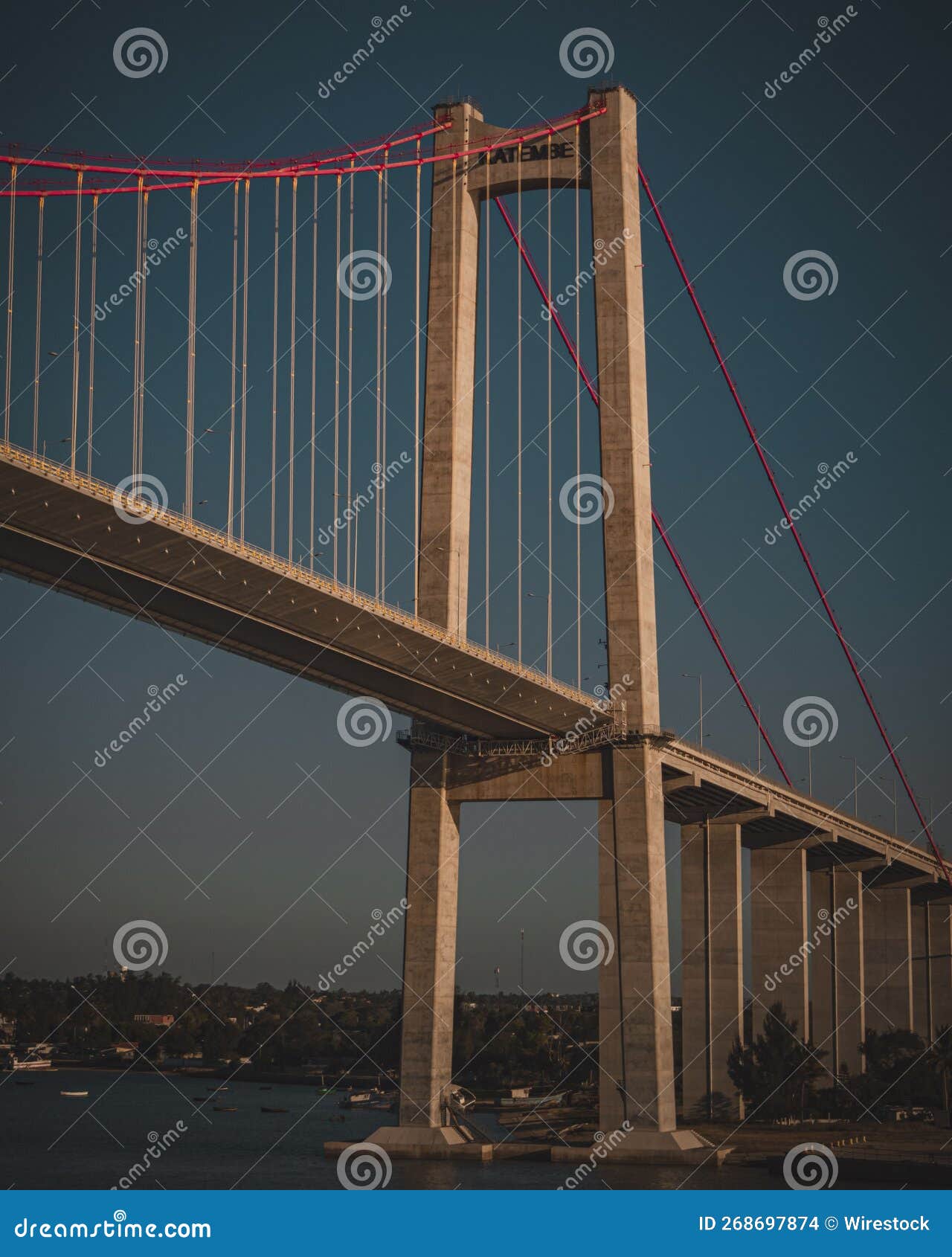 Vertical of a Bridge Against the Evening Sky Stock Photo - Image of ...