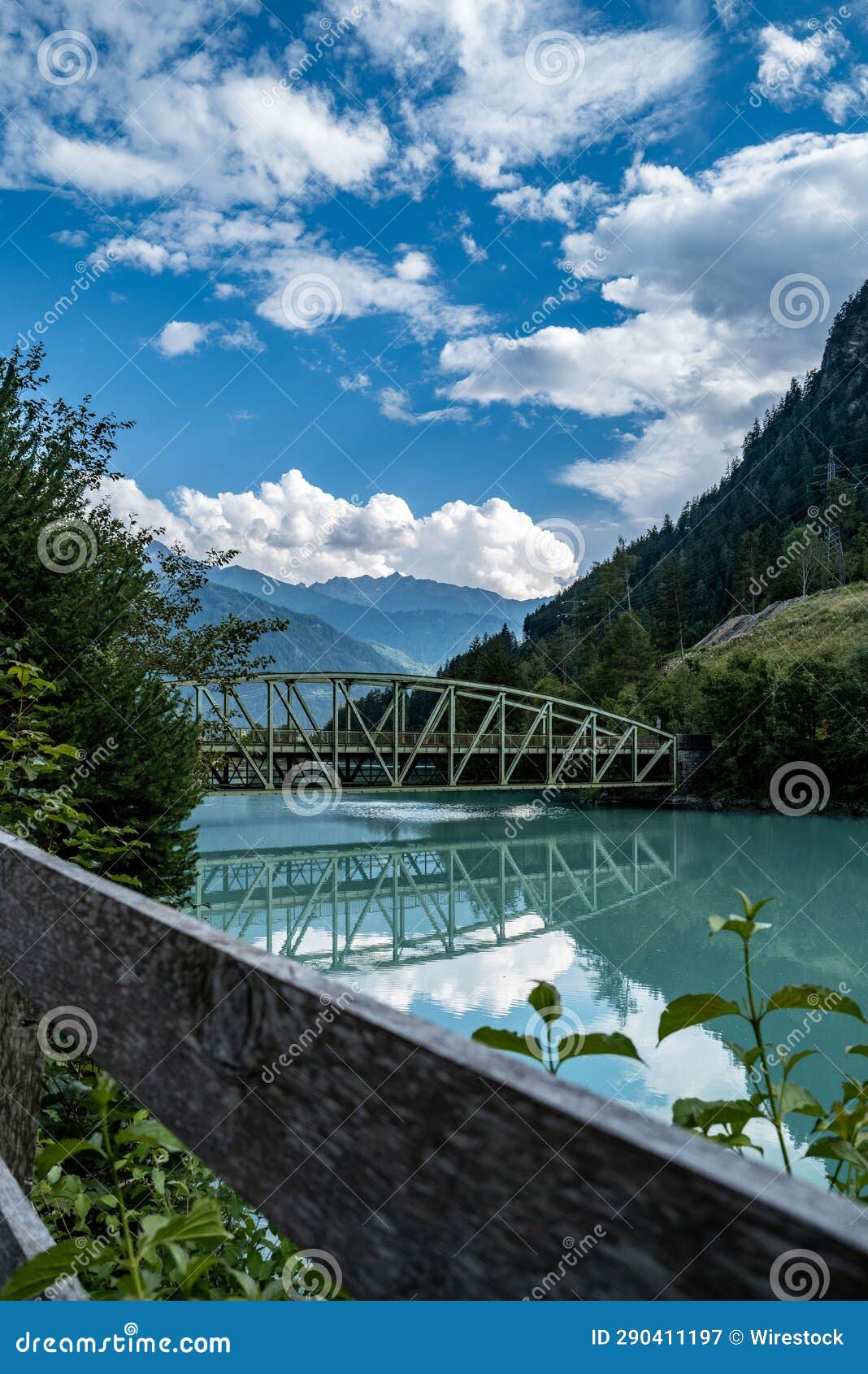 Vertical of a Bridge on a River in Green Mountains Stock Image - Image ...