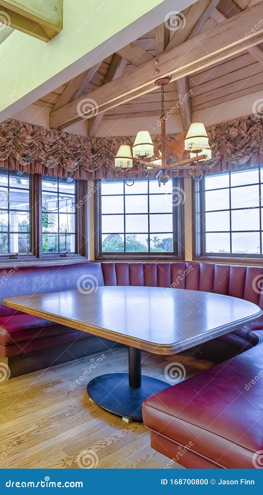 Vertical Bright, Open and Warm Kitchen with Vaulted Ceilings and Booth ...