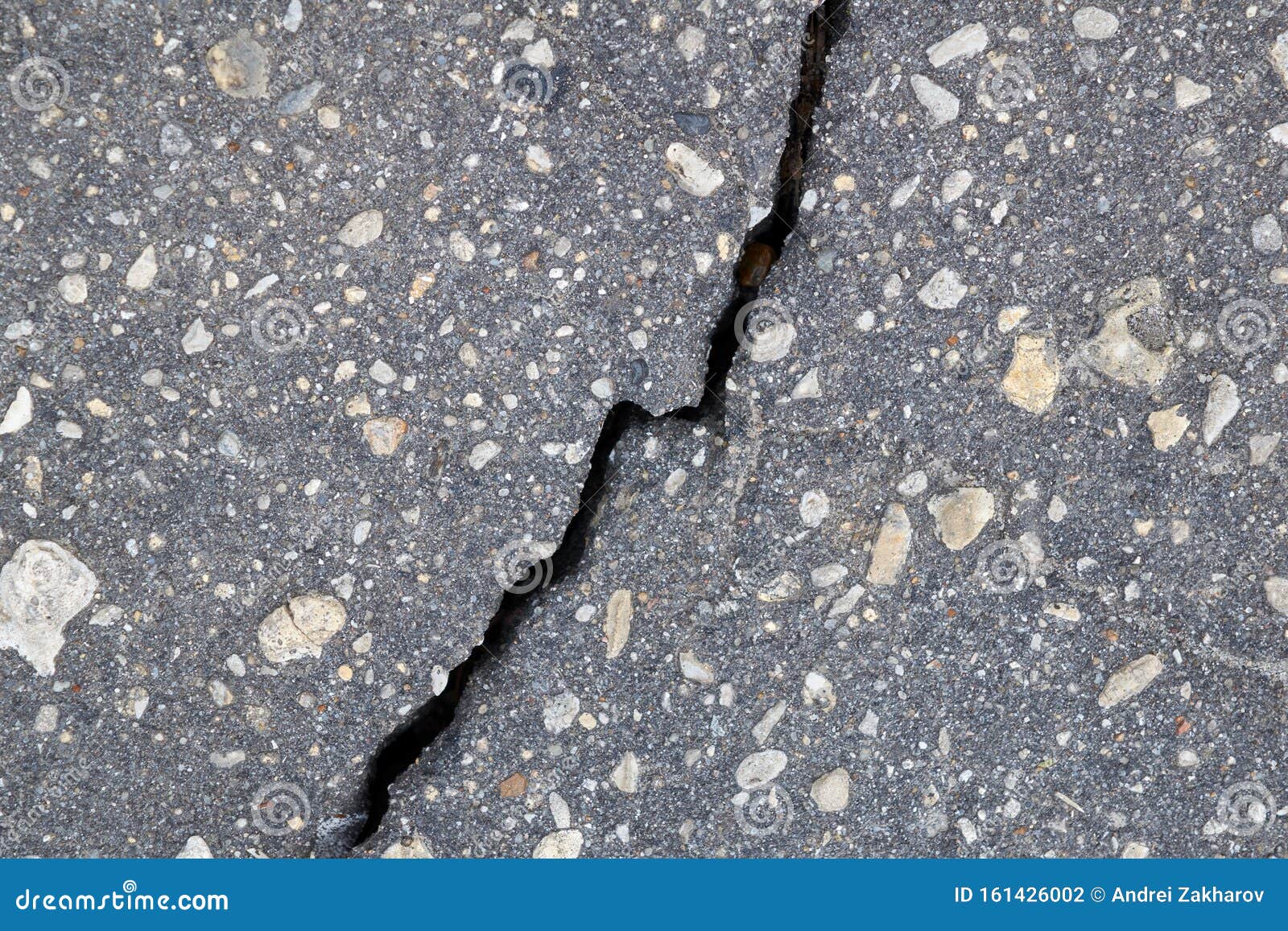 Vertical Broken Crack on the Surface of Asphalt Pavement Stock Photo ...