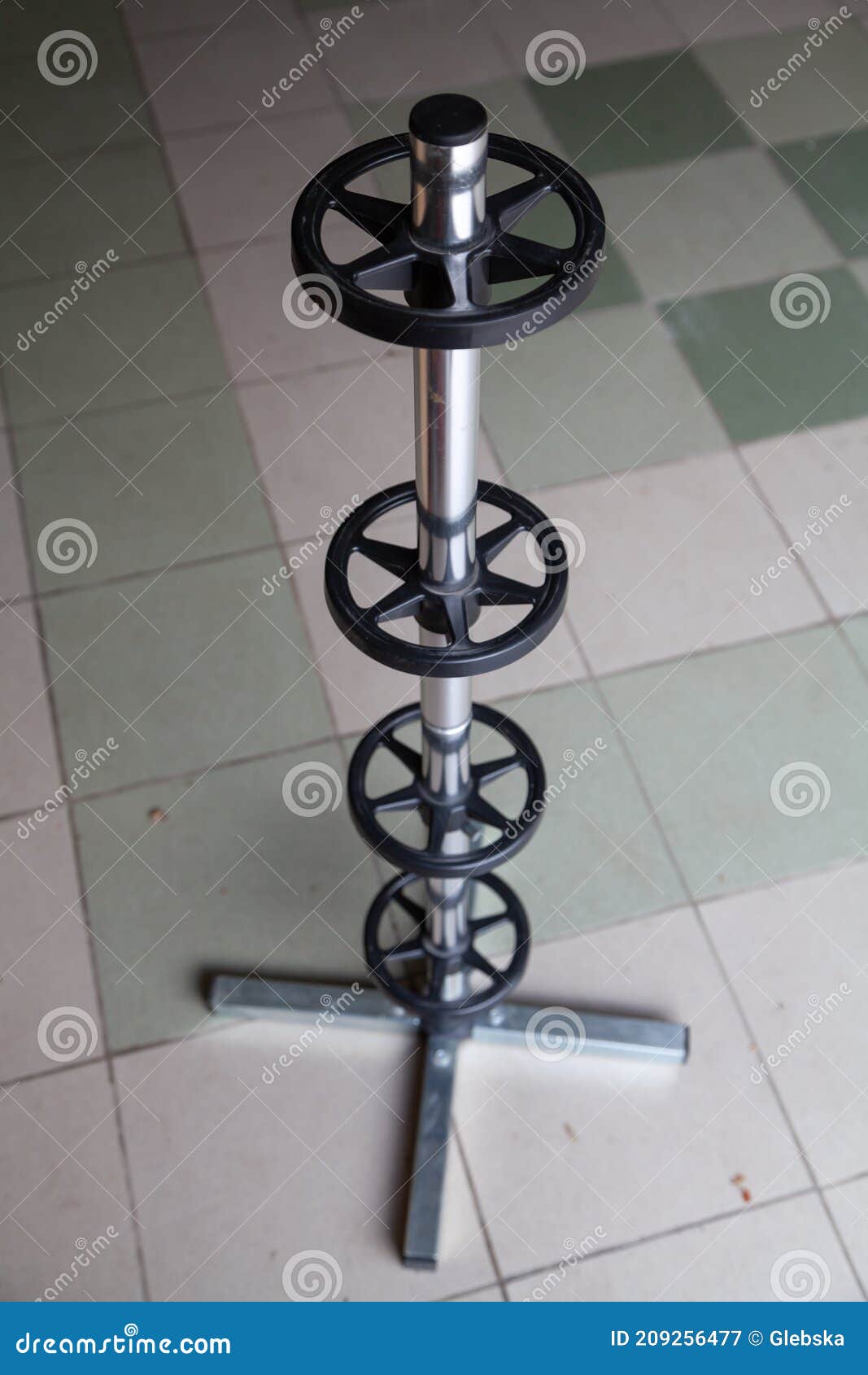 Vertical car wheel stand stock image. Image of floor - 209256477