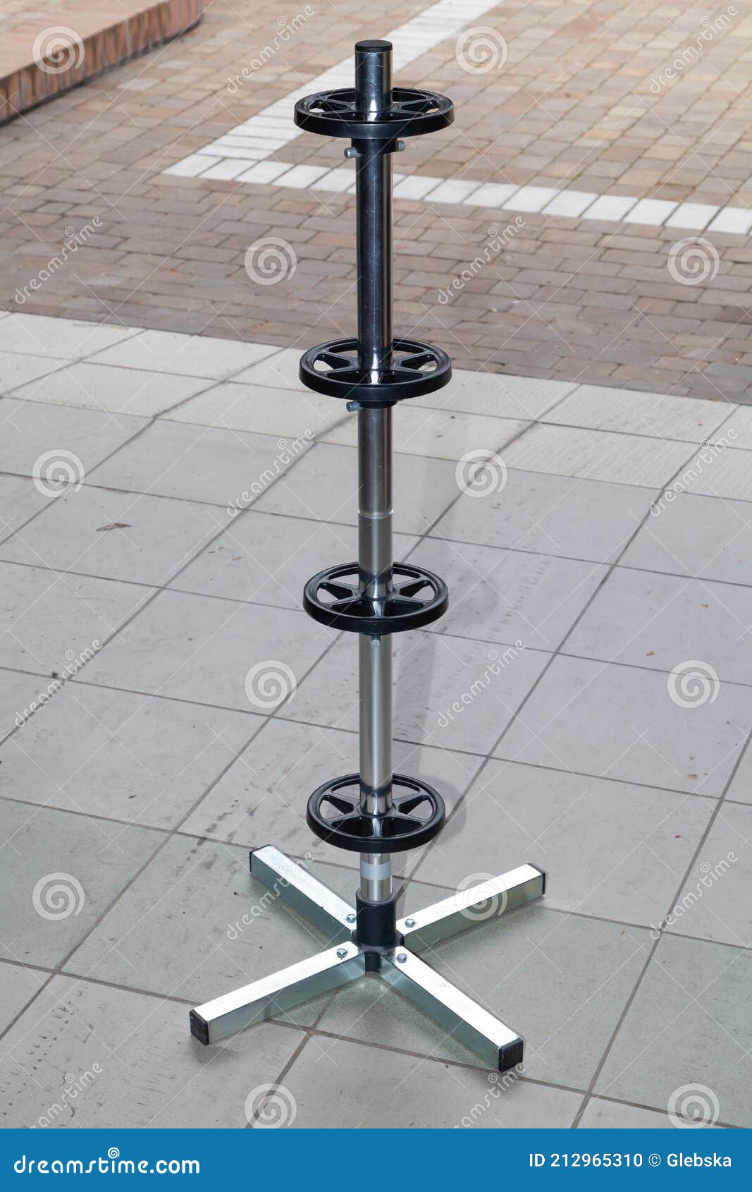 Vertical car wheel stand stock photo. Image of circumference - 212965310