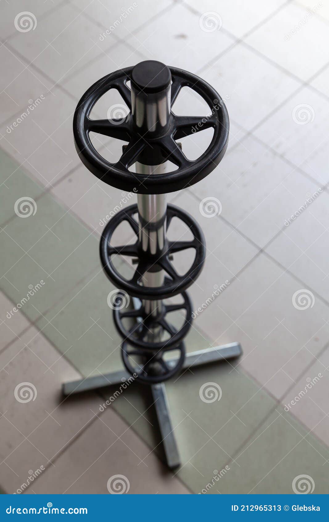 Vertical car wheel stand stock image. Image of geometric - 212965313