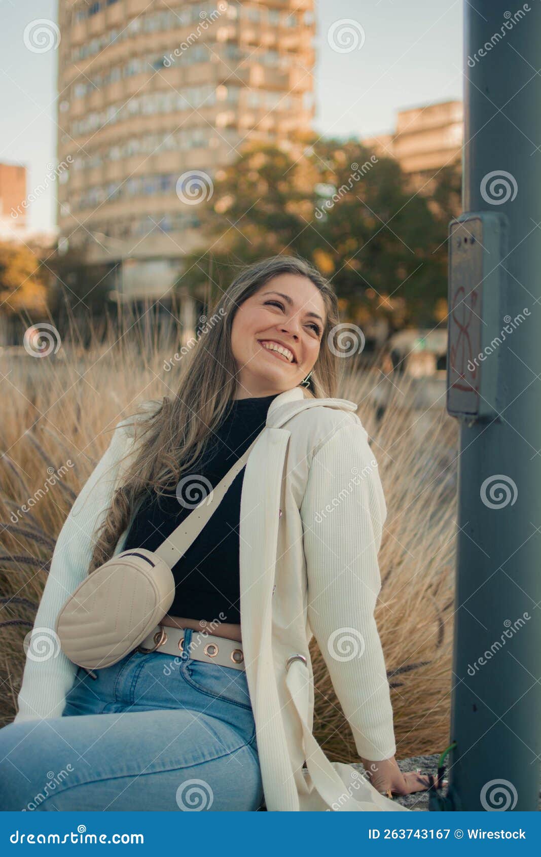 Vertical of a Cheerful Argentinian Woman with a Big Smile Sitting in ...