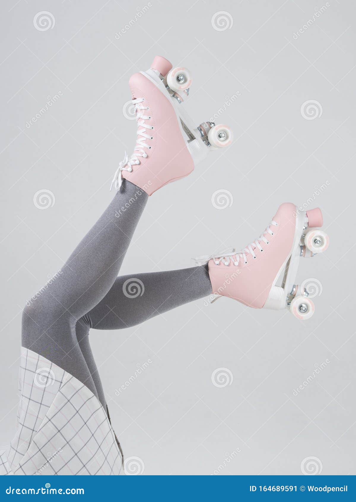 Vertical Close Up Female Legs in a Gray Tights with Pink Rollers Shoe ... Vertical Close Up Female Legs in a Gray Tights with Pink Rollers Shoe ...