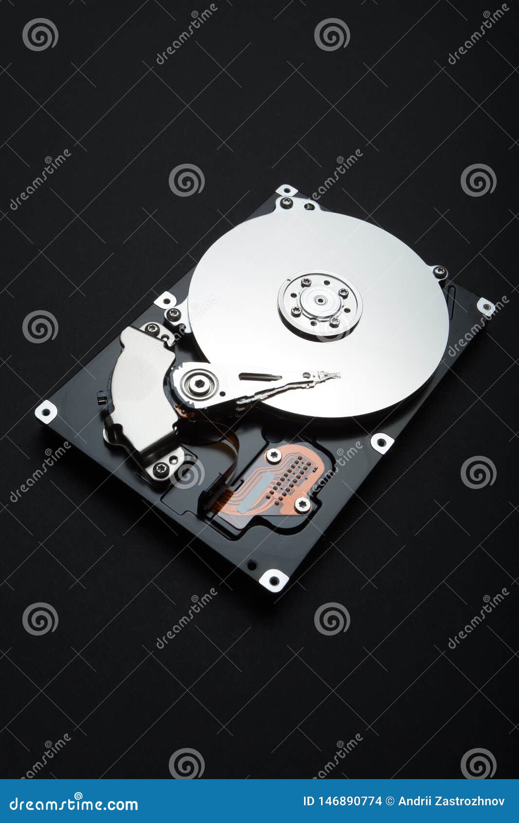 Vertical Close Up of Hard Disk with White Reflection on Black ...