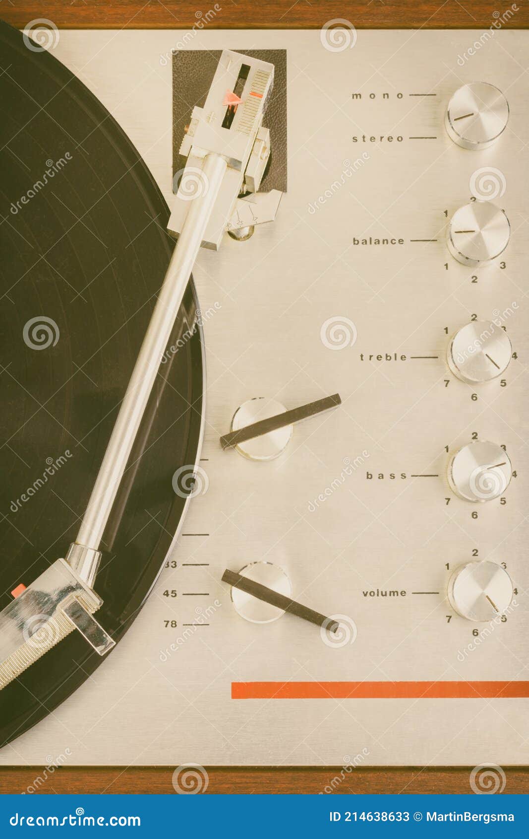 Vertical Close Up of a Vintage Seventies Turntable with Spinning Record ...