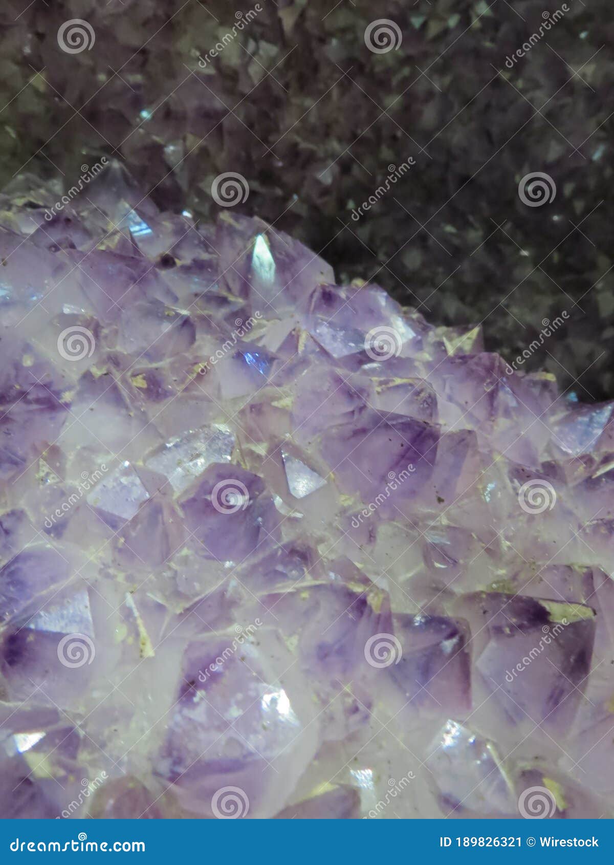 Vertical Closeup of Beautiful Purple Amethyst Crystal Formations in an ...
