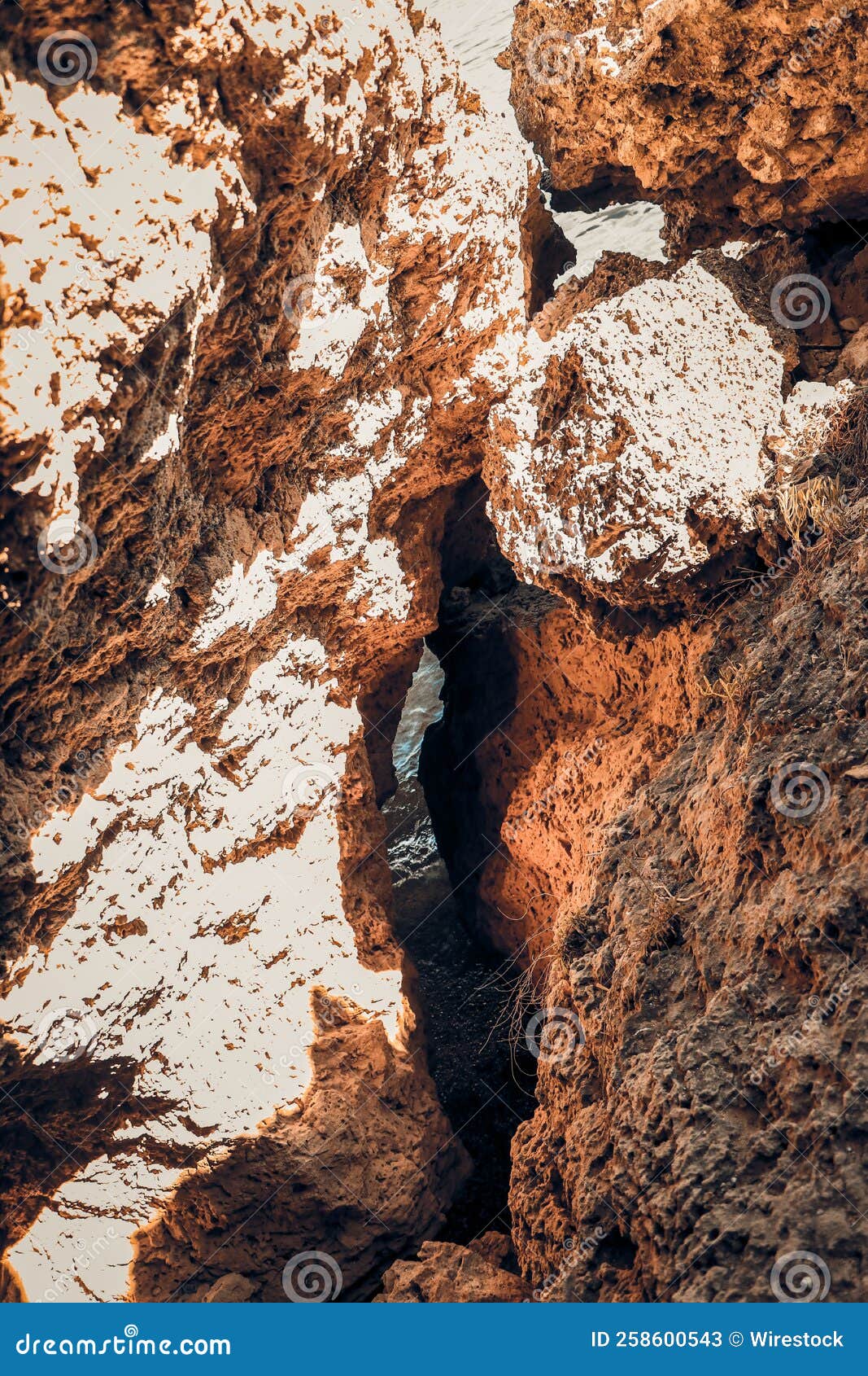 Vertical Closeup of Cave Surface and Rock Formations Captured Under ...