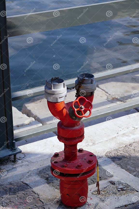 Vertical Closeup of a Fire Plug on a Sidewalk Stock Image - Image of ...