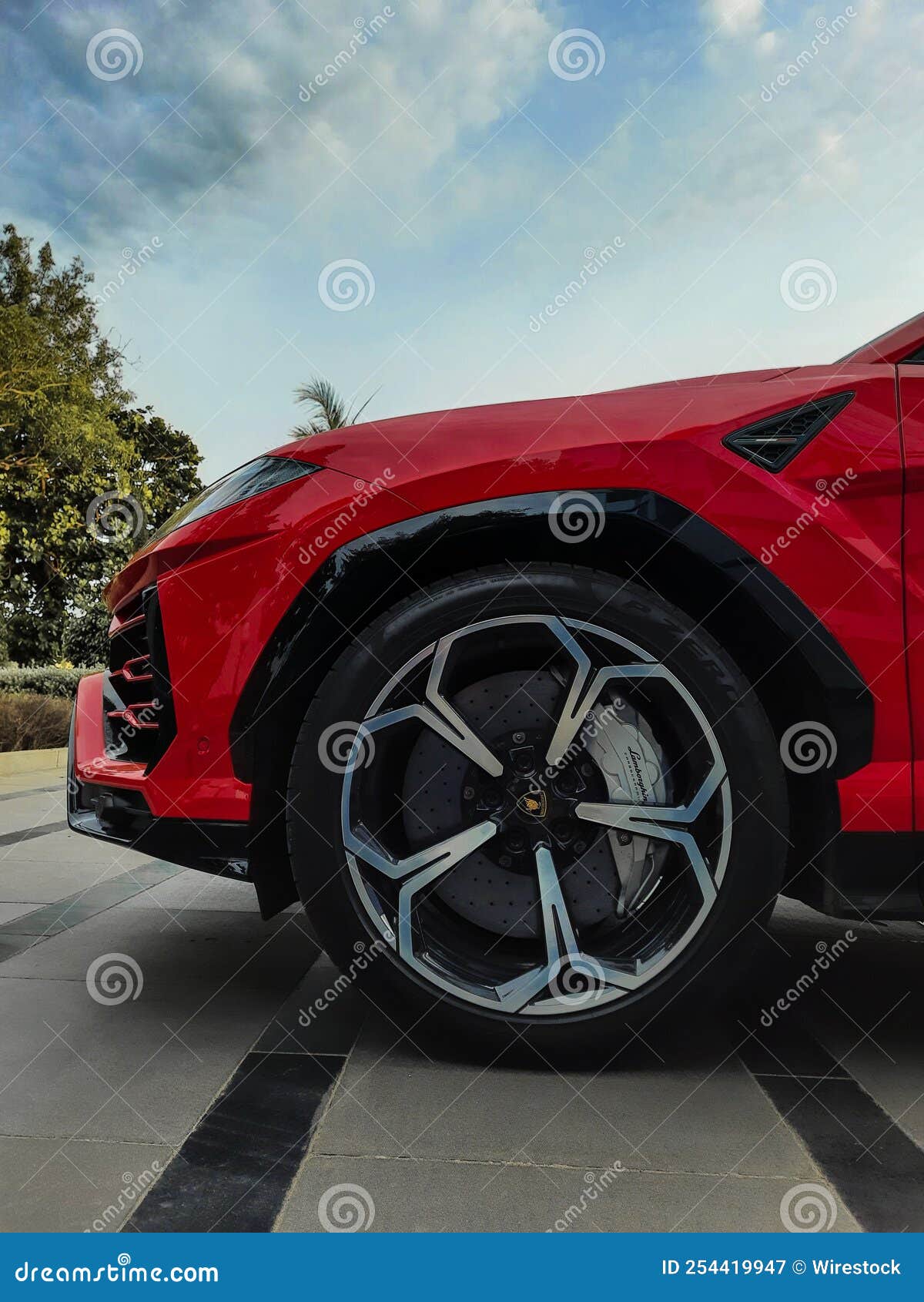 Vertical Closeup of the Front Side of a Red Lamborghini Urus. Editorial ...