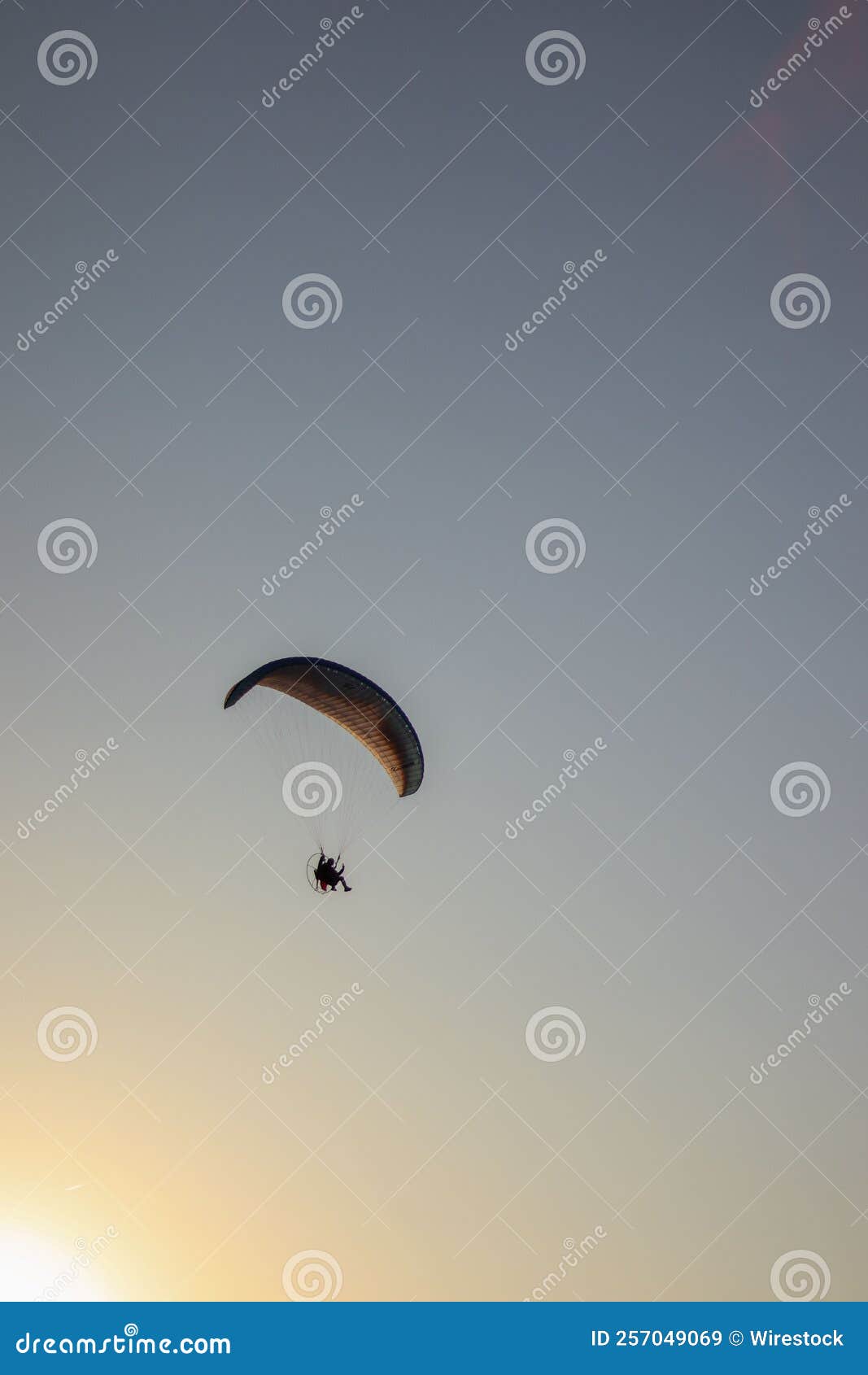 Vertical Closeup of a Paraglider Paragliding in the Sky Stock Image ...