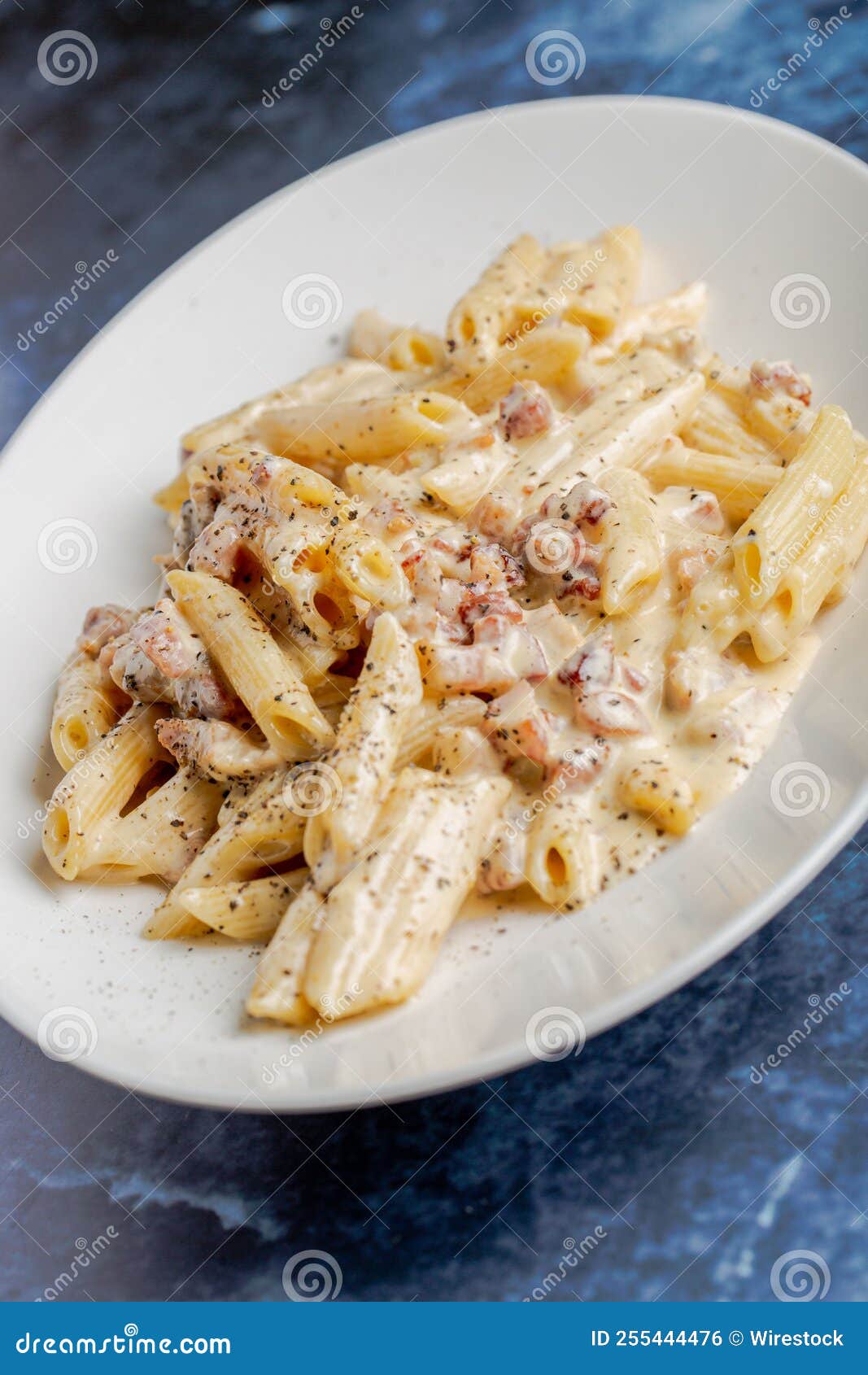 Vertical Closeup of Pasta Served in a Restaurant Stock Photo - Image of ...