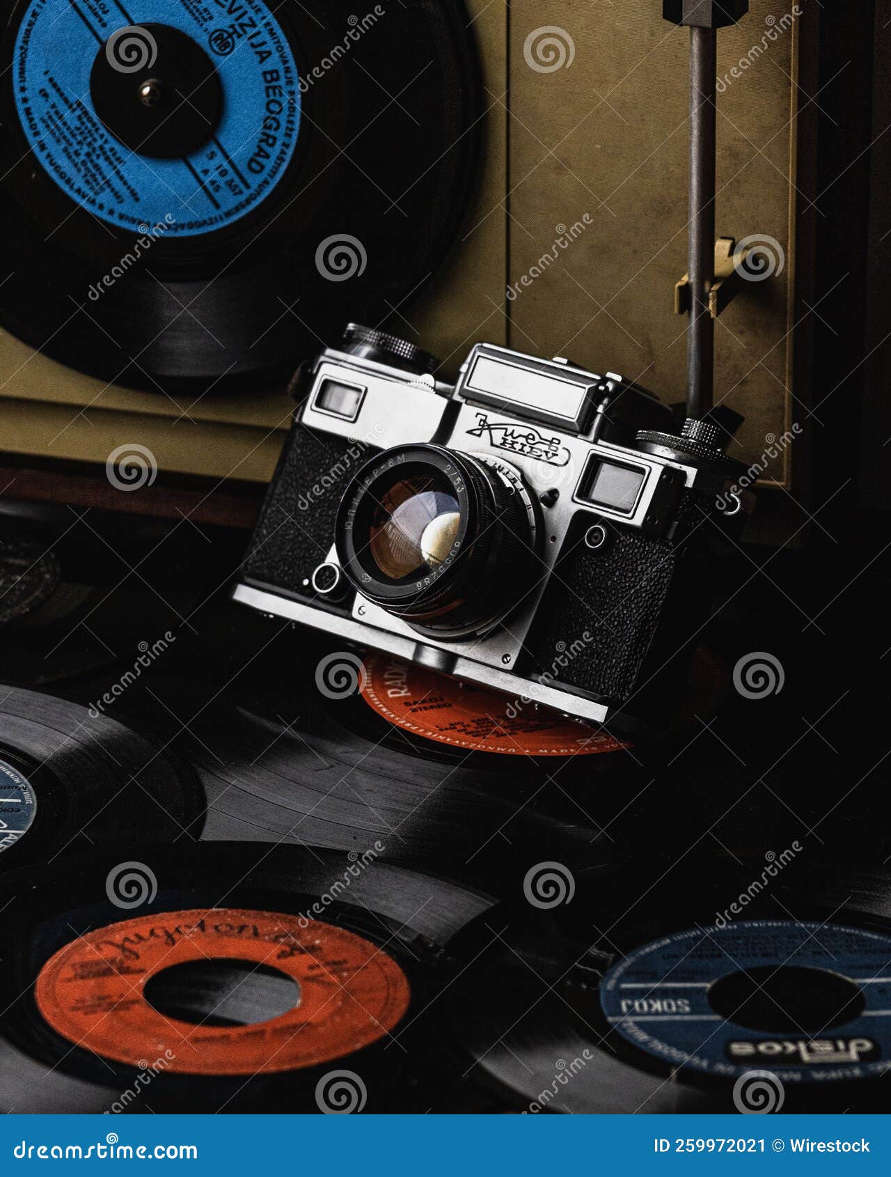 Vertical Closeup of a Retro Camera on Phonograph Records. Editorial ...