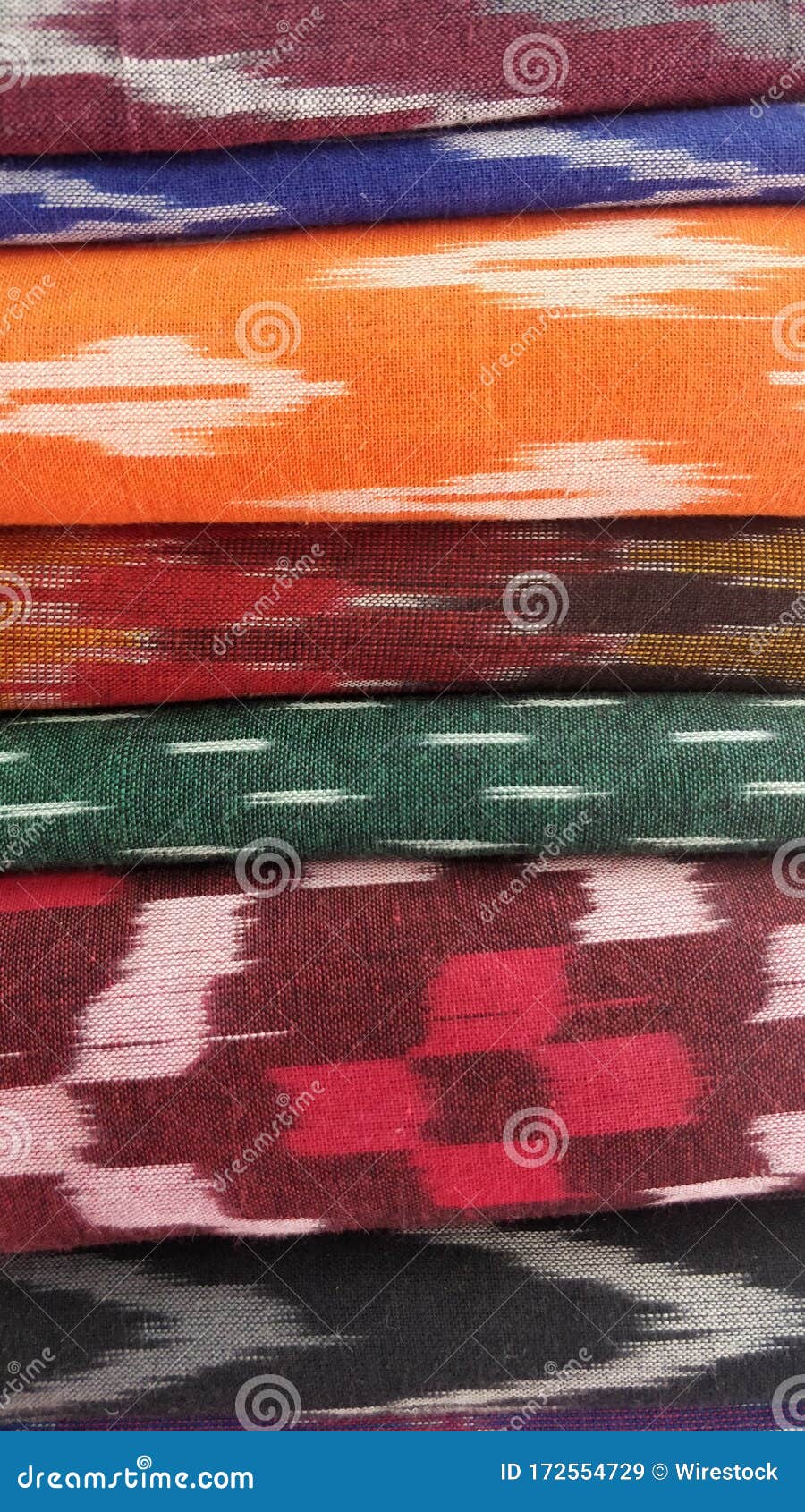 Vertical Closeup Shot of Colorful Textiles Stacked on Each Other Stock ...