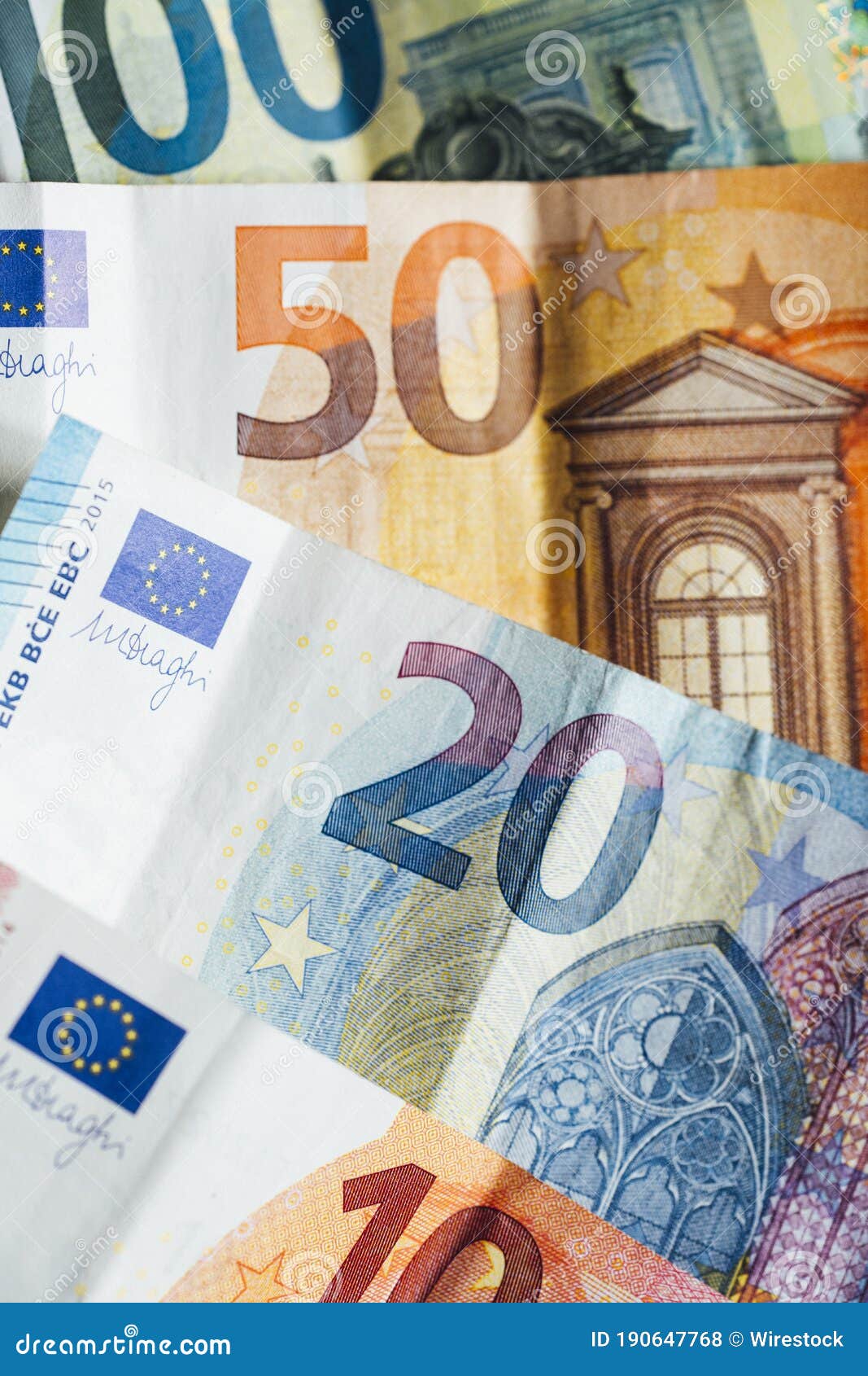 Vertical Closeup Shot of Euro Bills Spread on the Surface Stock Photo ...
