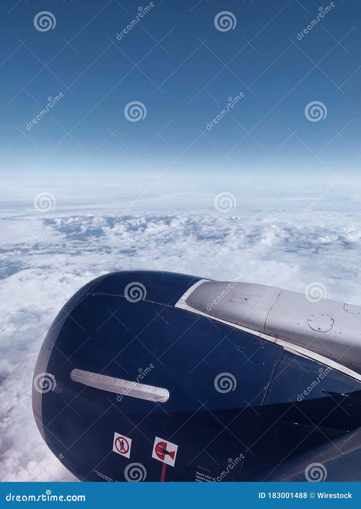 Vertical Closeup Shot of a Propeller of an Airplane Above the Clouds ...