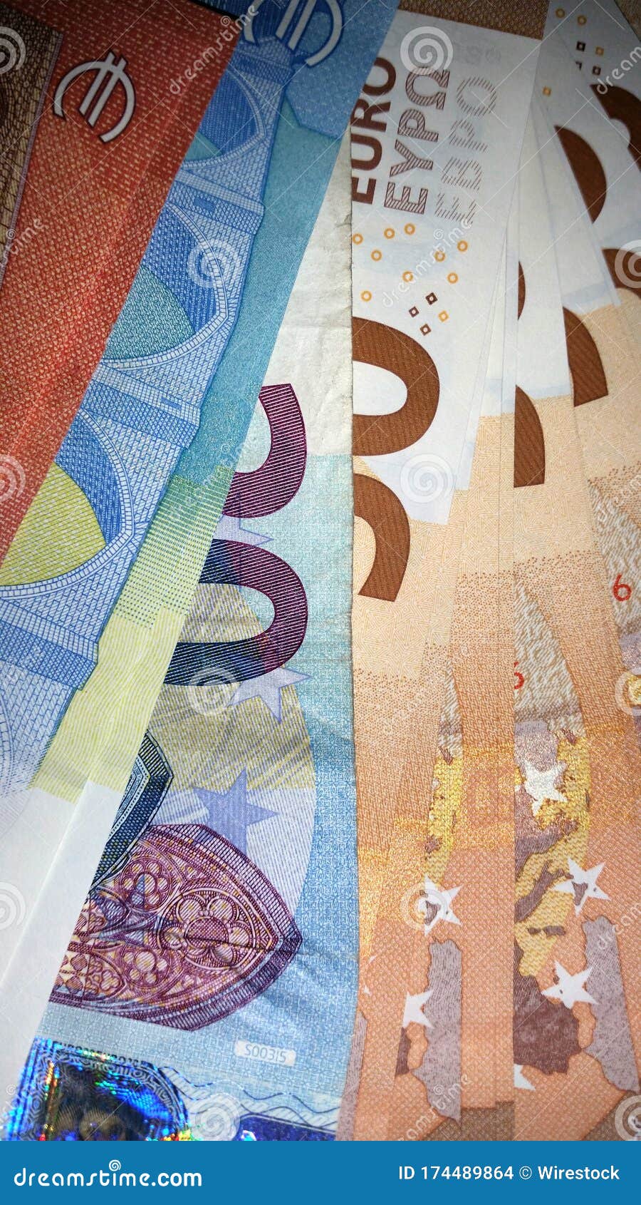 Vertical Closeup Shot of a Stack of Euros - Currency Concept Stock ...