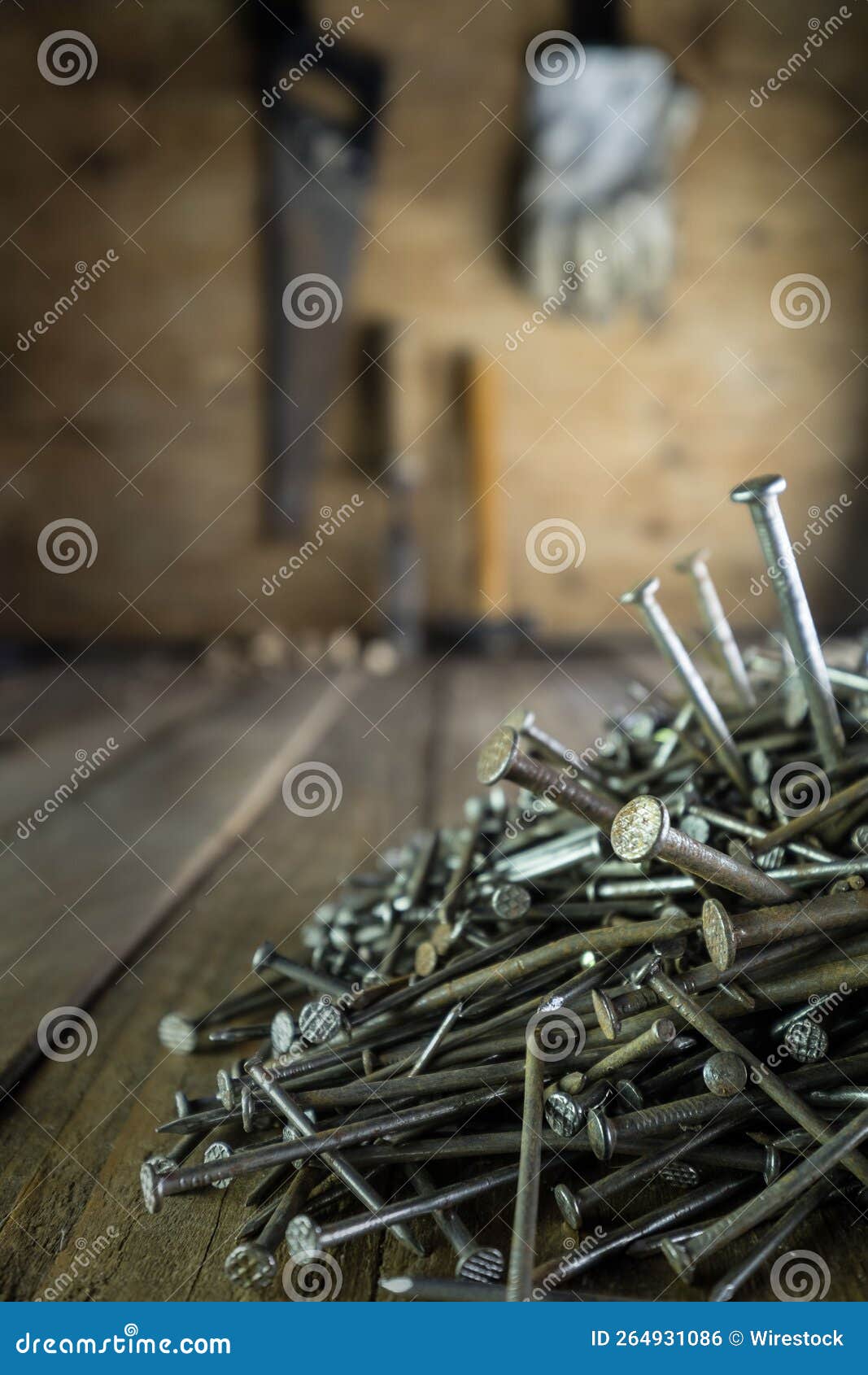 Vertical Closeup Shot of a Stack of Nails on the Wooden Ground Stock ...