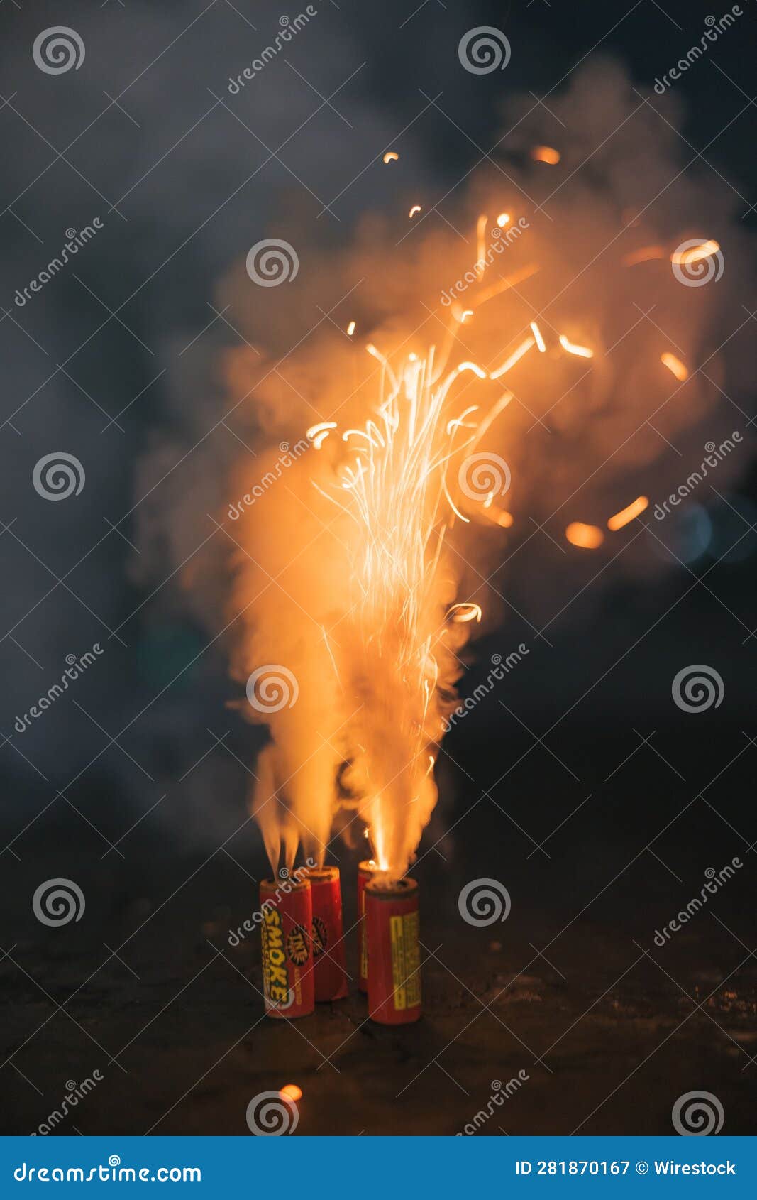 Vertical Closeup Shot of Two Small Tnt Cannons Exploding with Orange ...