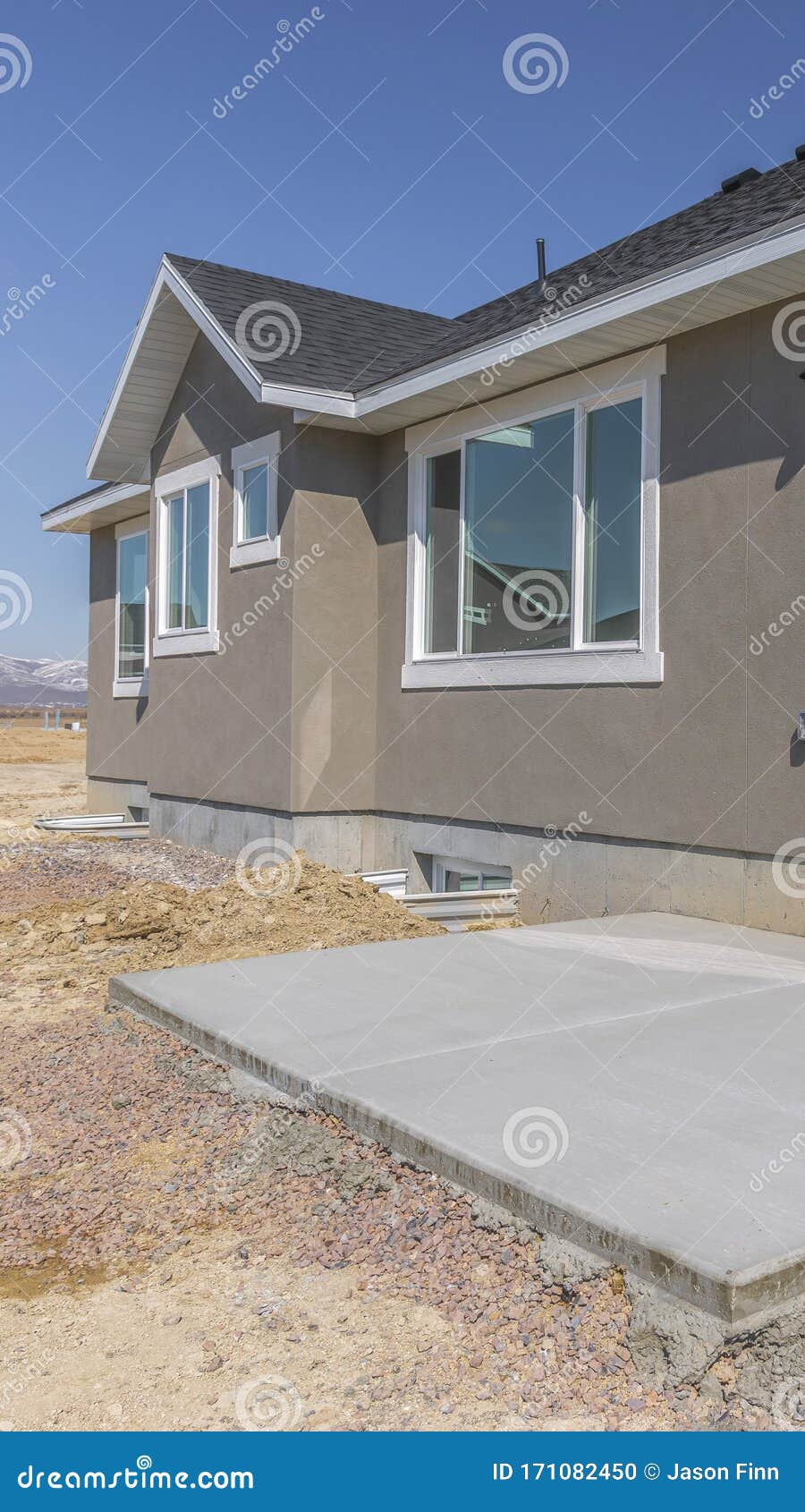 Vertical Construction Outside a Home with Flat Concrete Surface ...