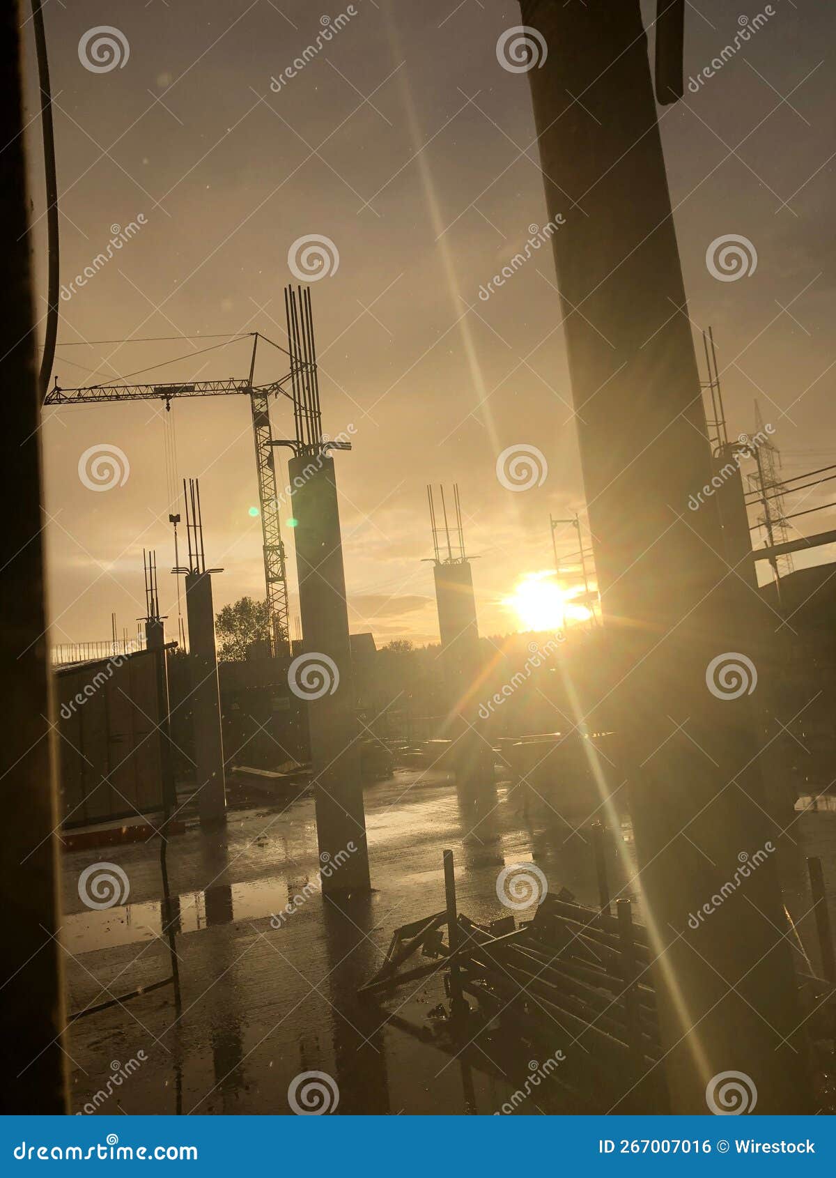 Vertical of Construction Process with Sun Shining on the Sky Stock ...
