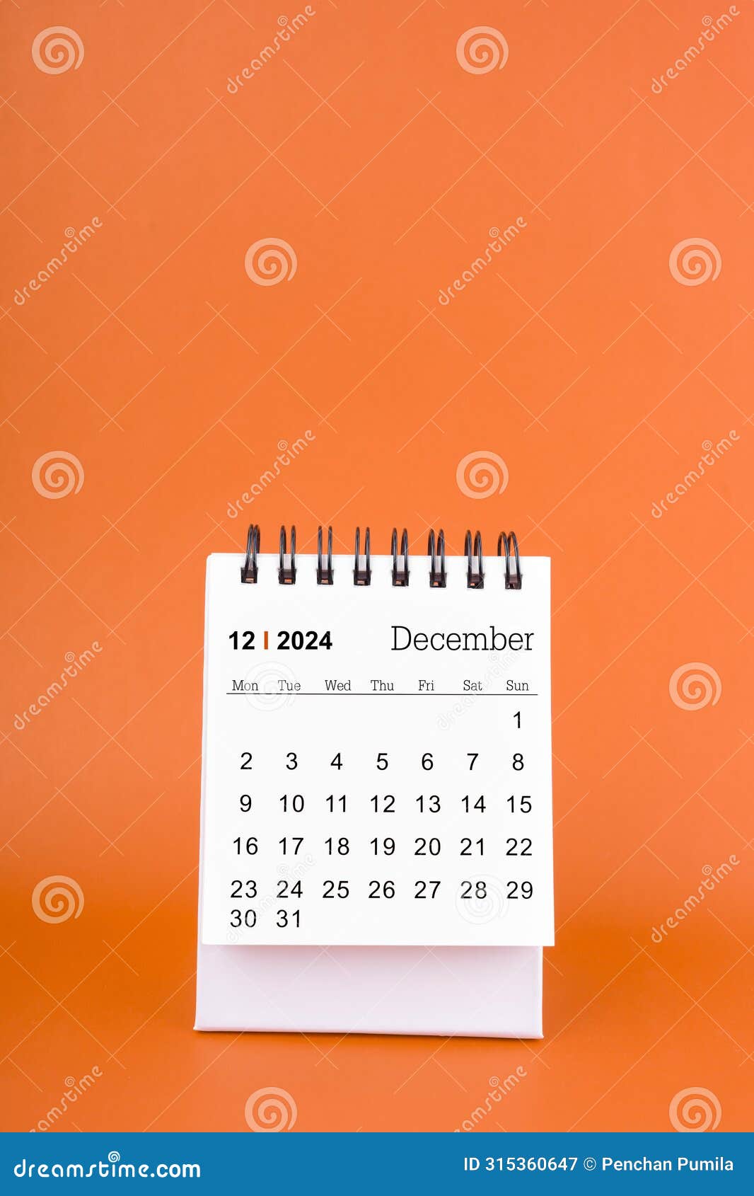 Vertical of December 2024 Table Calendar on Orange Background Stock ...