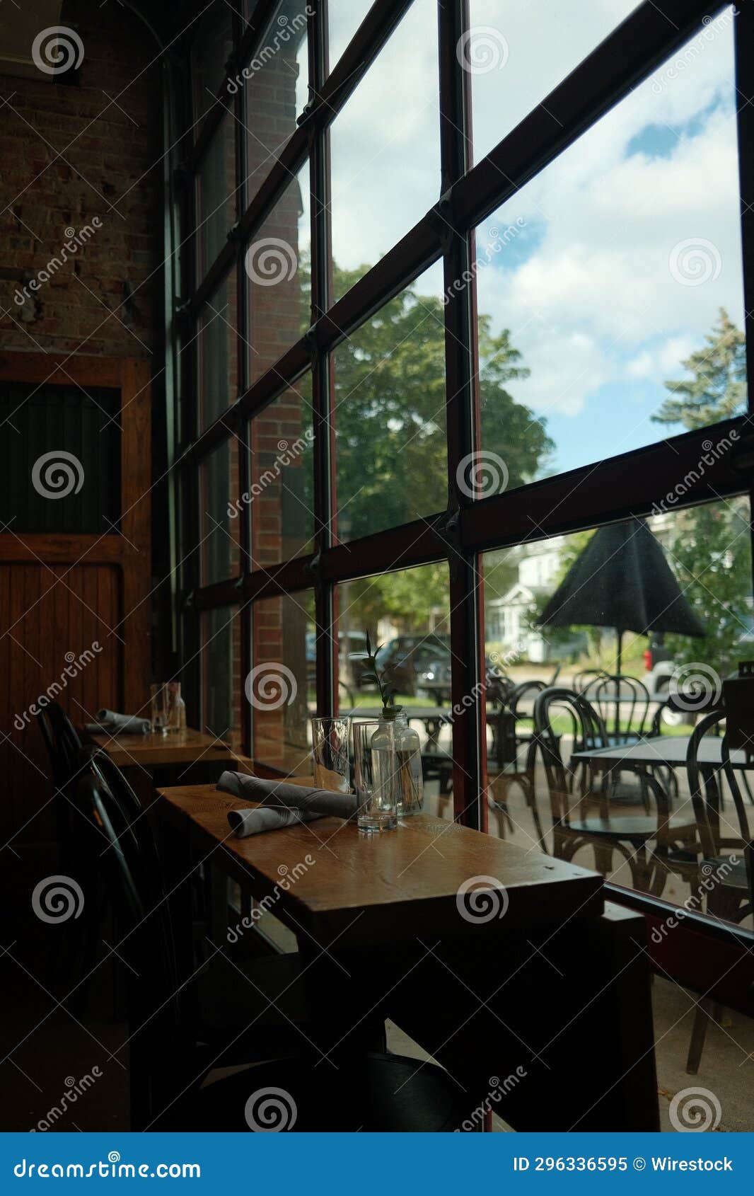 Vertical of a Decorated Table at a Cafe Near a Window Stock Image ...