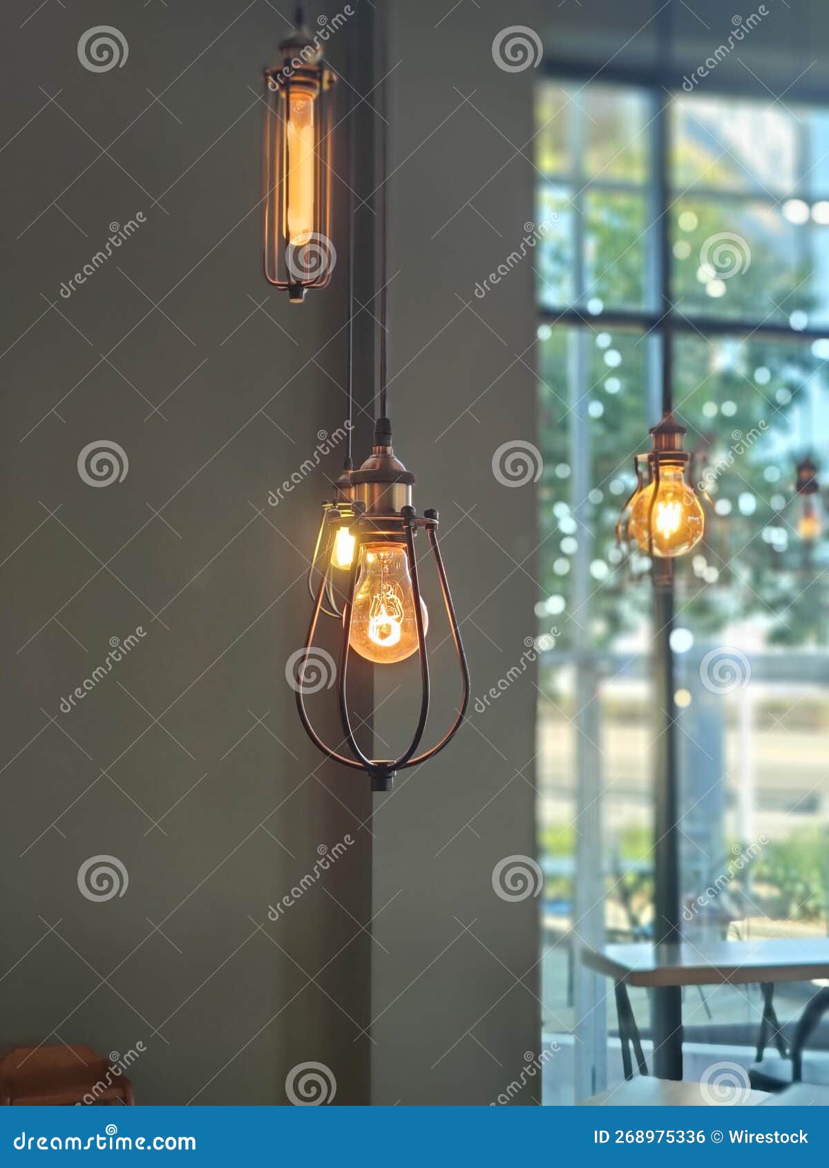 Vertical of Decorative Light Bulbs Hanging in a Cafe Stock Photo ...
