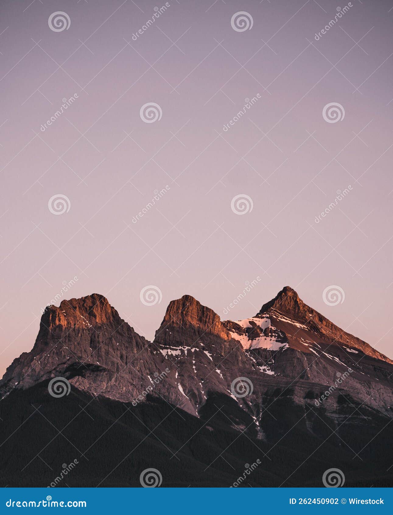 Vertical Distant View of a Mountain Peak during Sunset Stock Photo ...