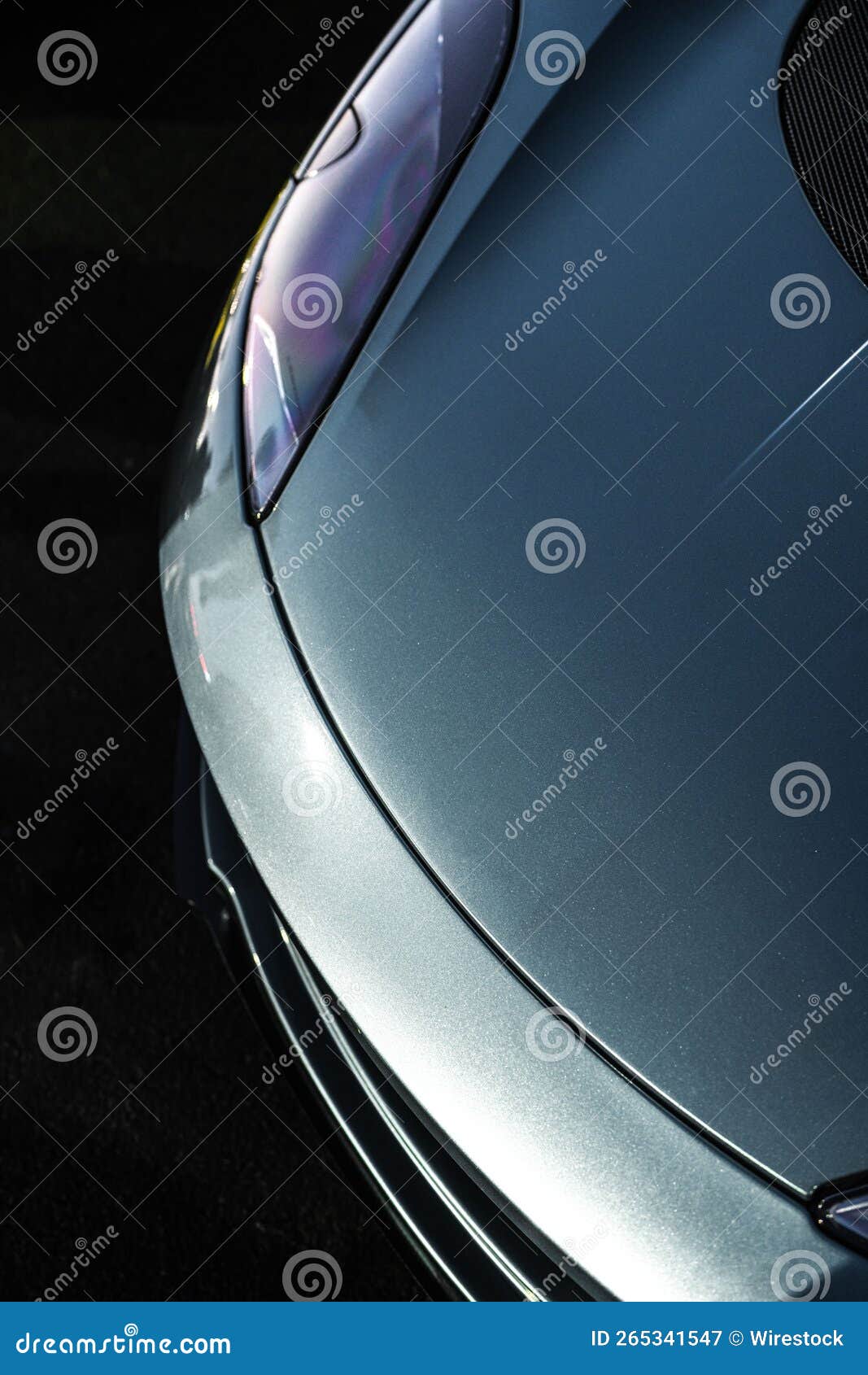 Vertical Dramatic Shot of the Headlight of a Luxury Car Stock Image ...