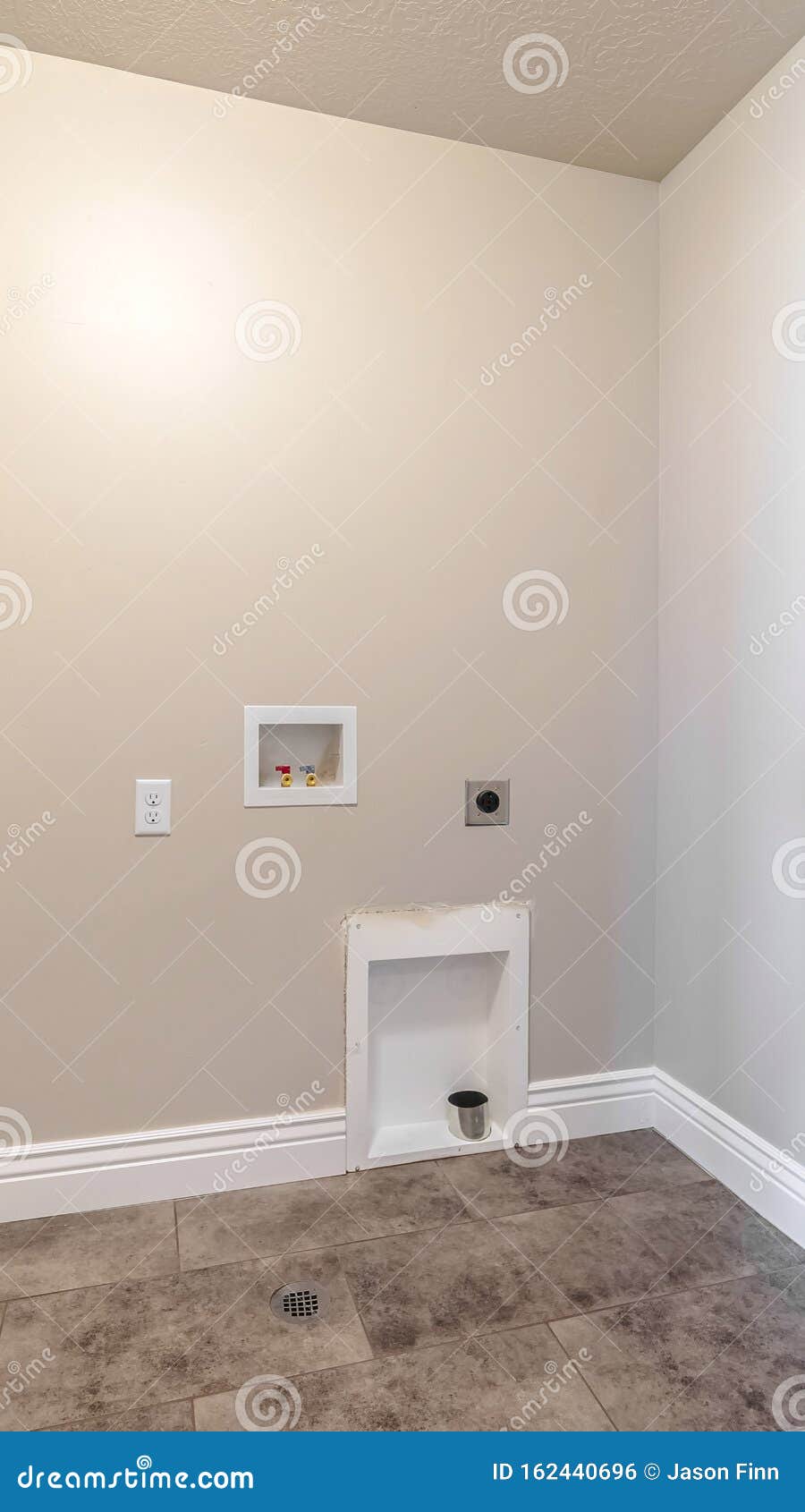Vertical Empty Laundry Room with Water Connections Empty Room Stock ...