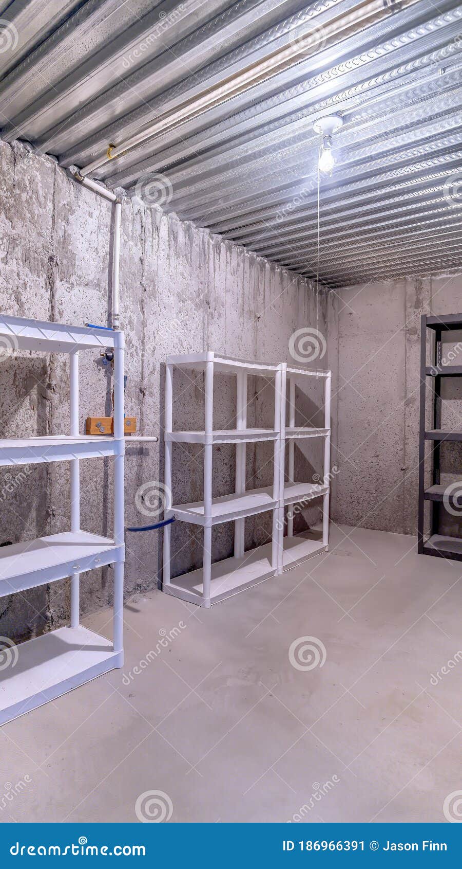 Vertical Empty Multi Layer Metal Racks Inside a Storage Room with ...