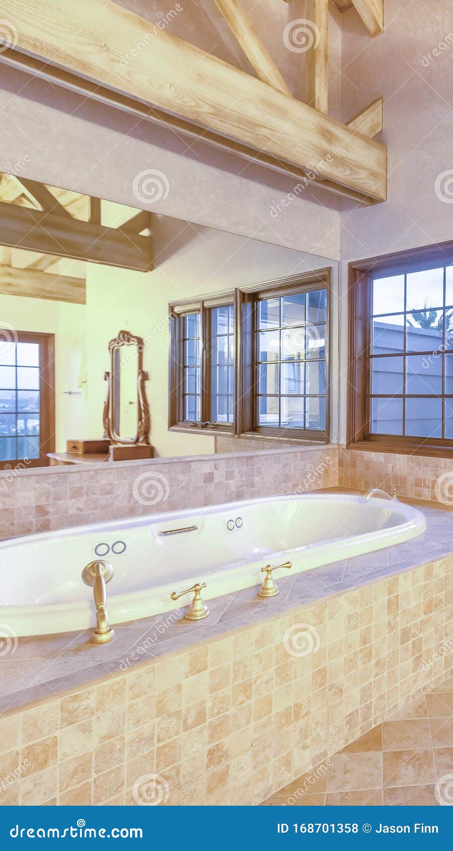 Vertical Frame Bright, Open and Bathroom with Vaulted Ceilings and a ...