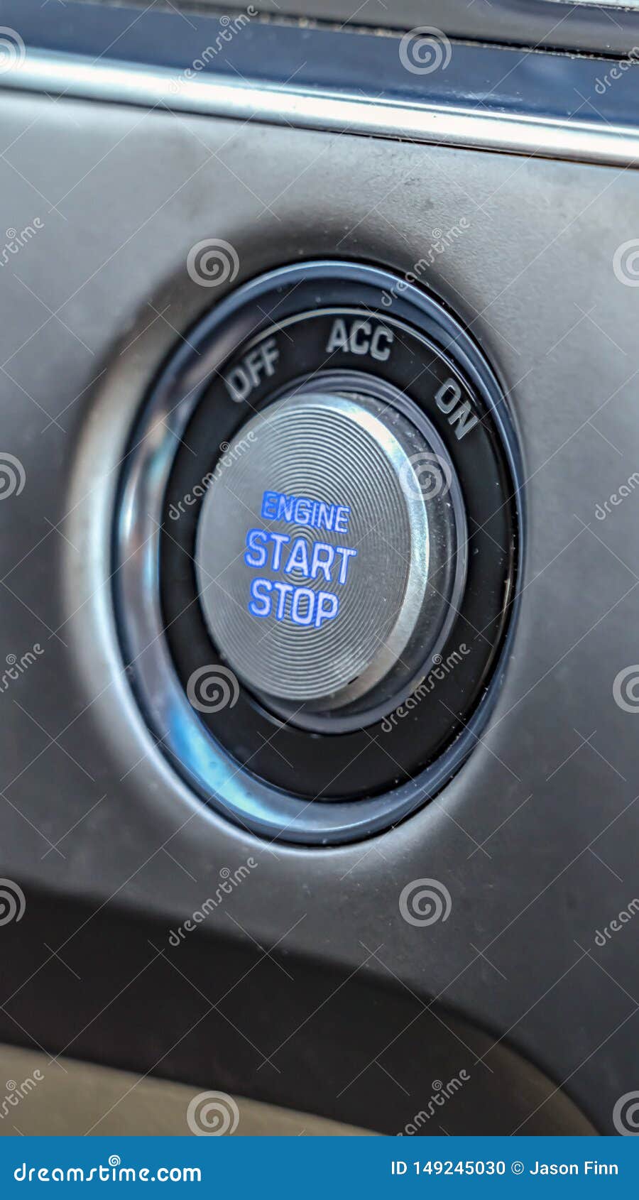 Vertical Frame Close Up View of an Engine Push Start and Stop Button ...