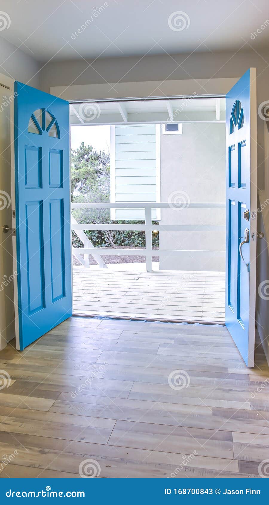 Vertical Frame Wide Open Front Doors with Townhome Stock Image - Image ...