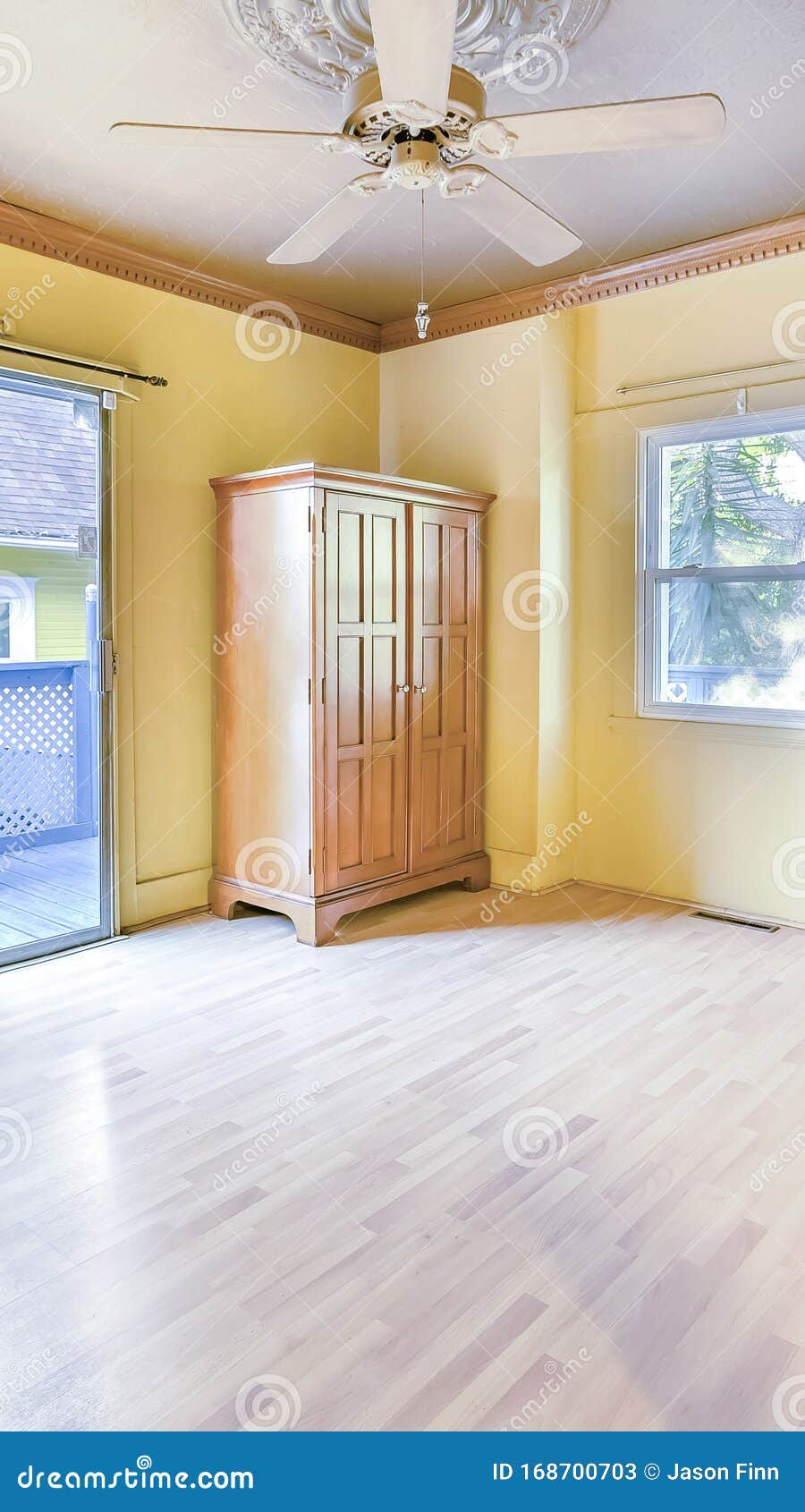 Vertical Frame Interior of Empty Master Bedroom in Bright Sunny San ...