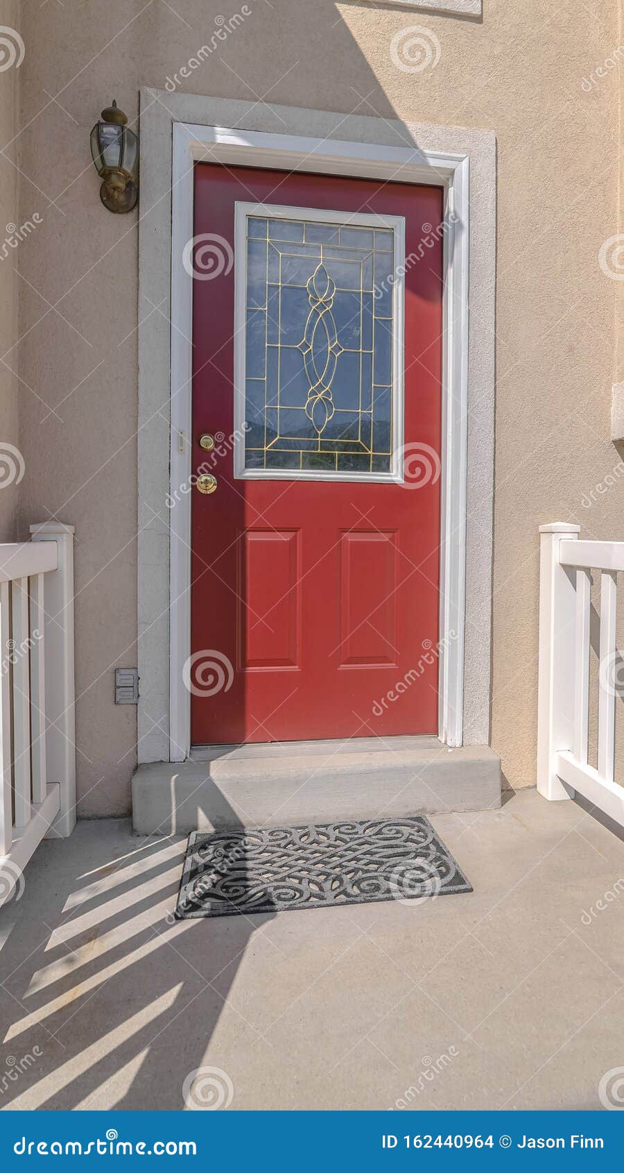 Vertical Frame Red Front Door and Steps of Traditional Home Stock Photo ...