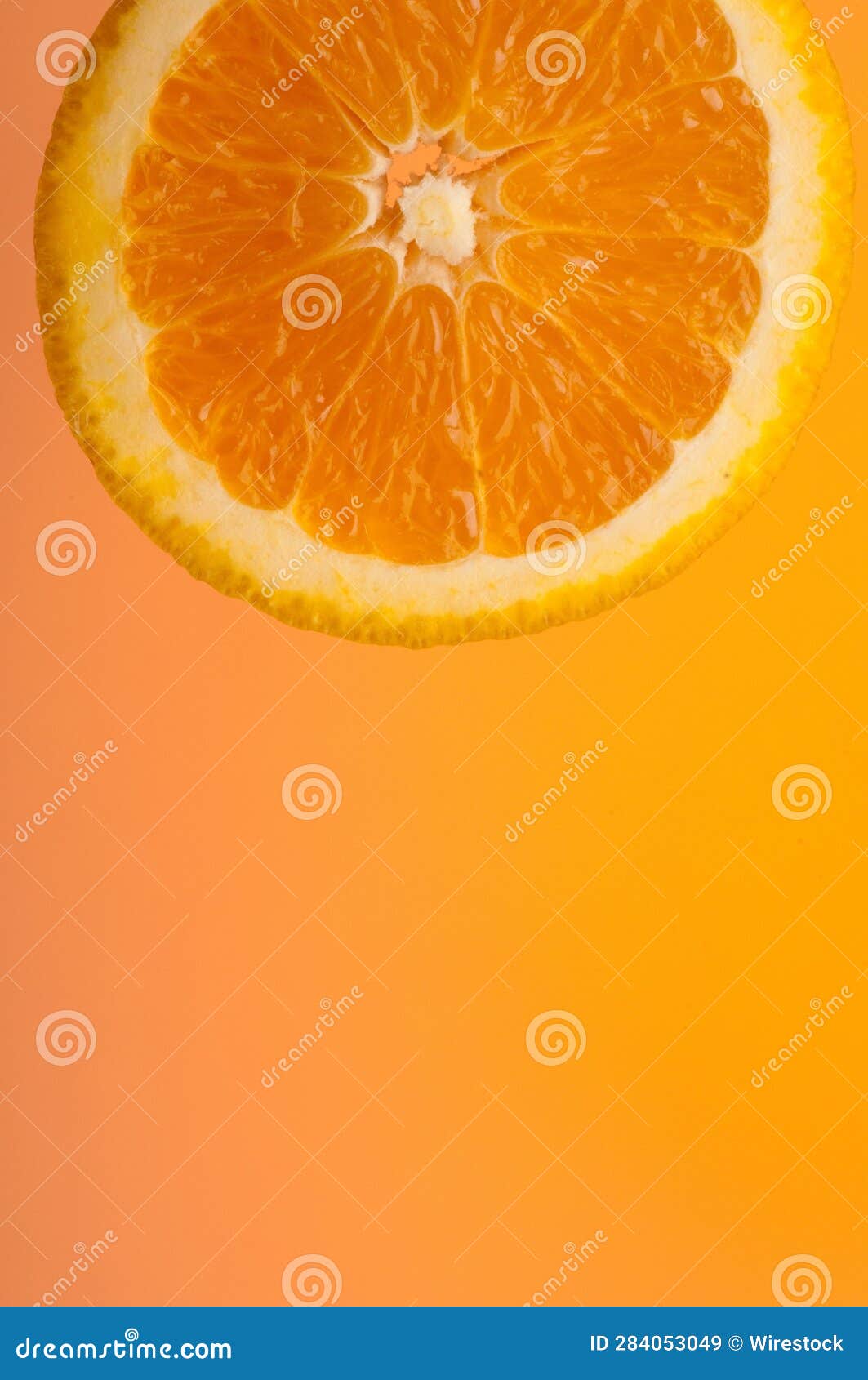 Vertical of Fresh Orange Cut on an Orange Background Stock Image ...