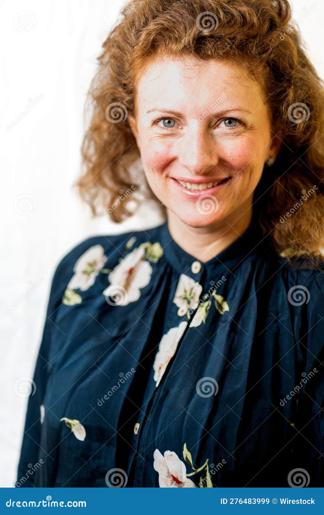 Vertical of a Ginger Model Posing, Dressed in an Elegant Blue Shirt on ...