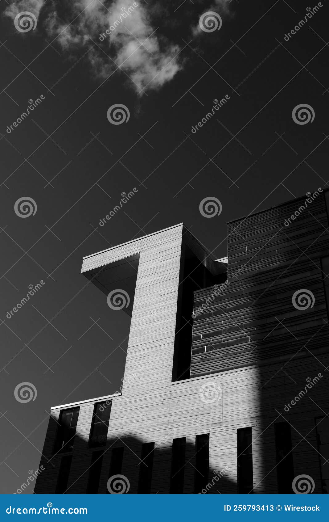 Vertical Gray Scale Shot of a Building Under a Cloudy Sky Stock ...