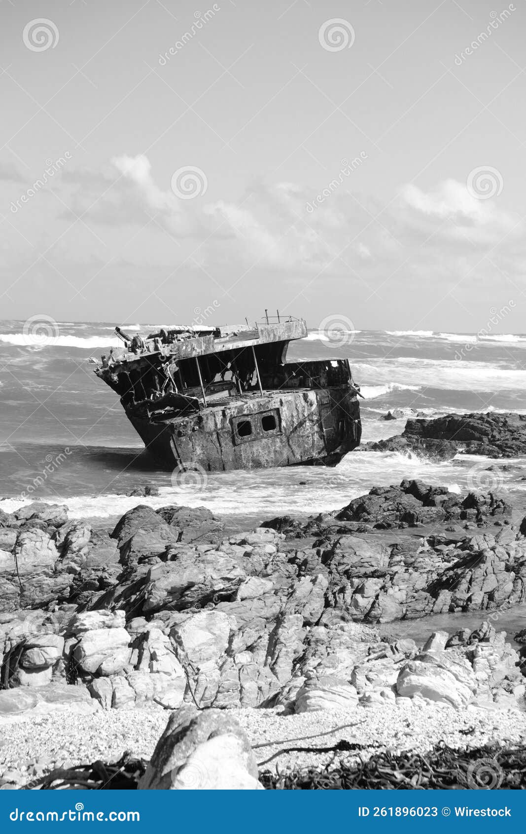 Vertical Grayscale of a Shipwreck in Seascape Coastline Hulk of a Cargo ...