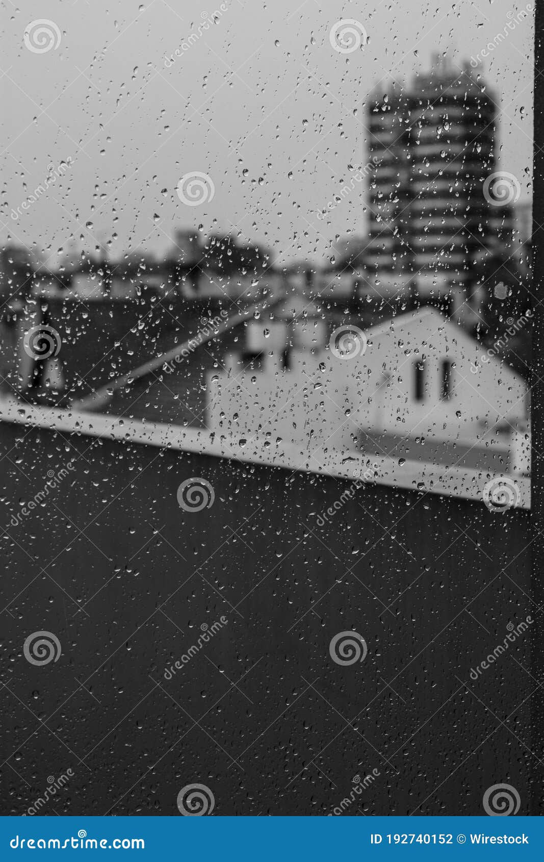 Vertical Grayscale Shot of Buildings from a Wet Window after Rain Stock ...