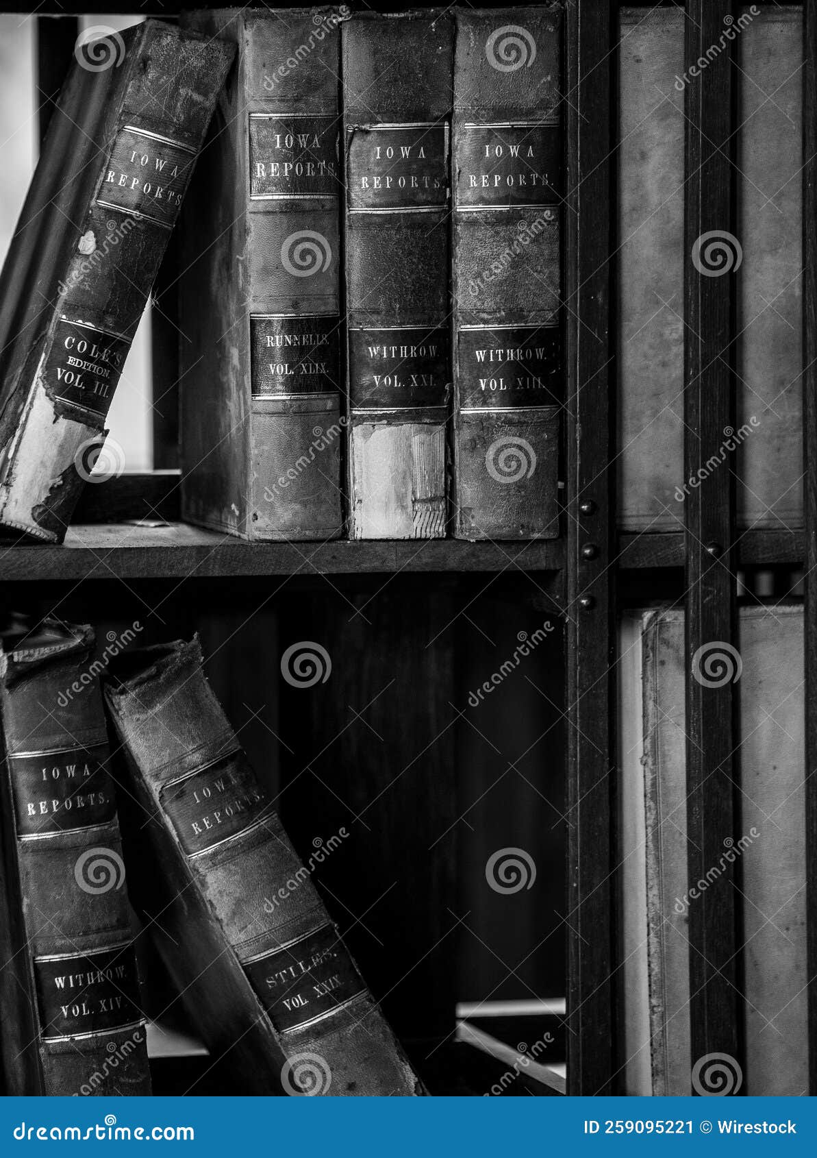 Vertical Grayscale Shot of Historic Old Books on a Broken Shelf Stock ...