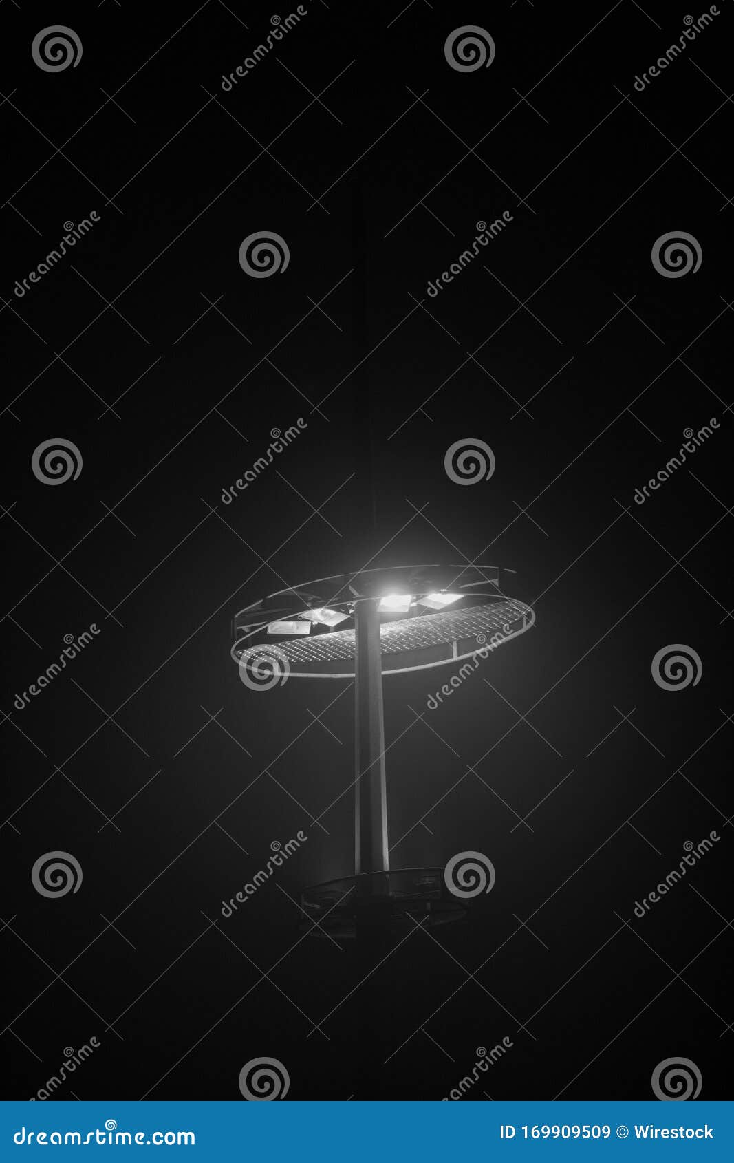 Vertical Grayscale Shot of a Lit Street Lights Stock Image - Image of ...