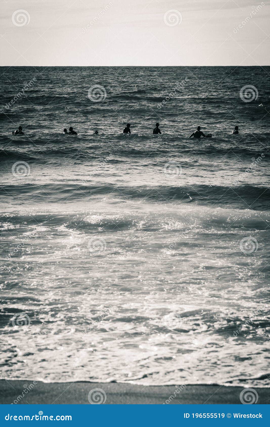 Vertical Grayscale Shot Of A Crowd Of People Walking In A Mall In ...
